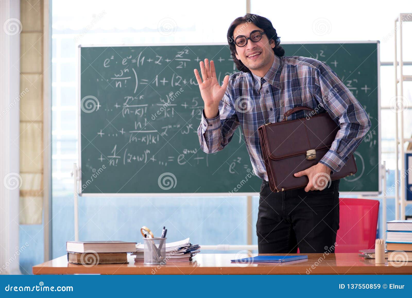 The Young Funny Math Teacher in Front of Chalkboard Stock Image - Image ...