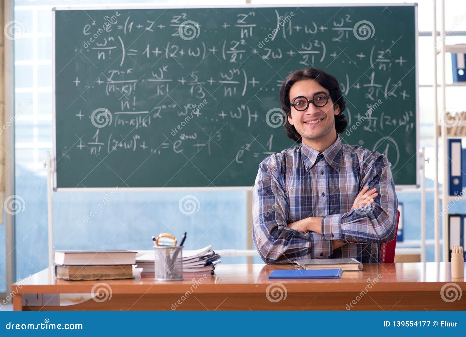 The Young Funny Math Teacher in Front of Chalkboard Stock Image - Image ...