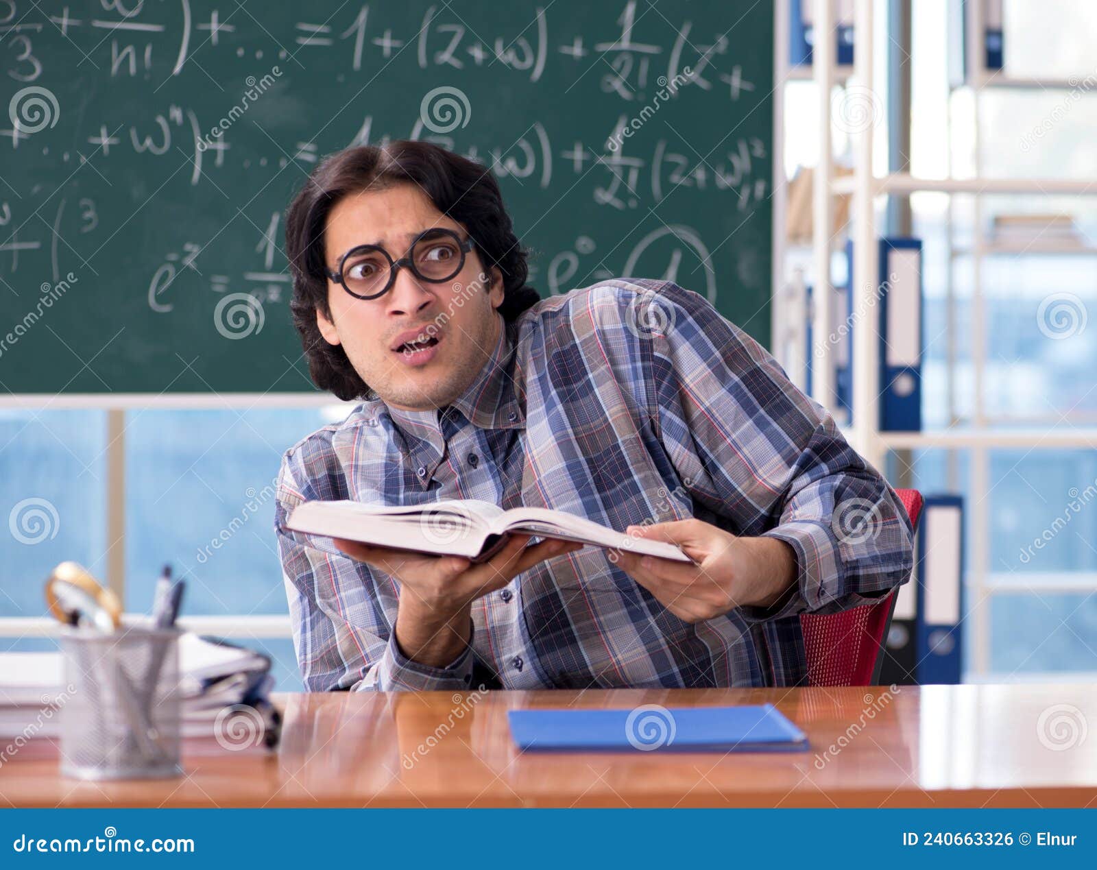 The Young Funny Math Teacher in Front of Chalkboard Stock Photo - Image ...