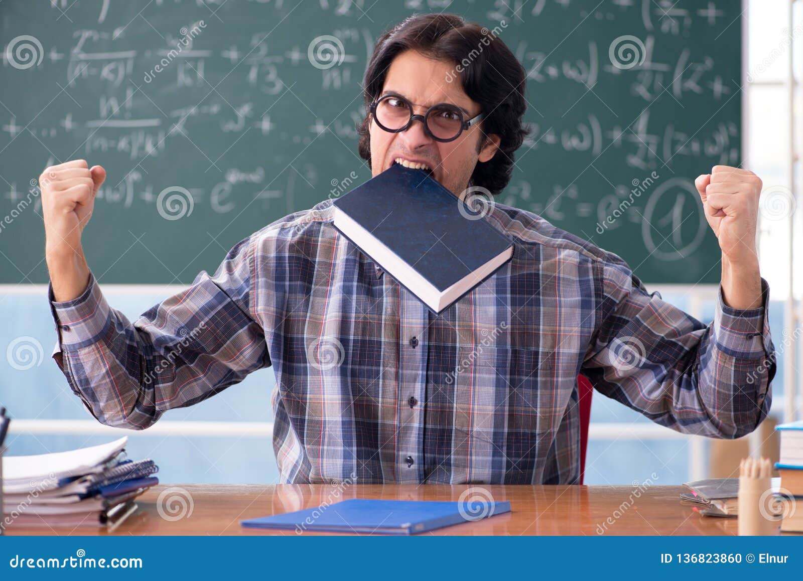The Young Funny Math Teacher in Front of Chalkboard Stock Photo - Image ...