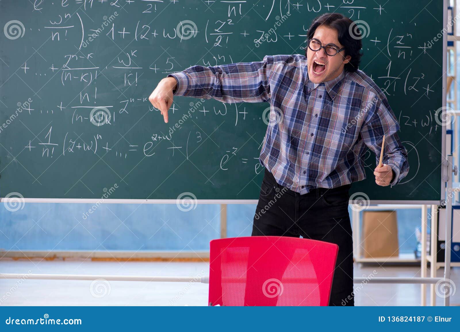 The Young Funny Math Teacher in Front of Chalkboard Stock Image - Image ...