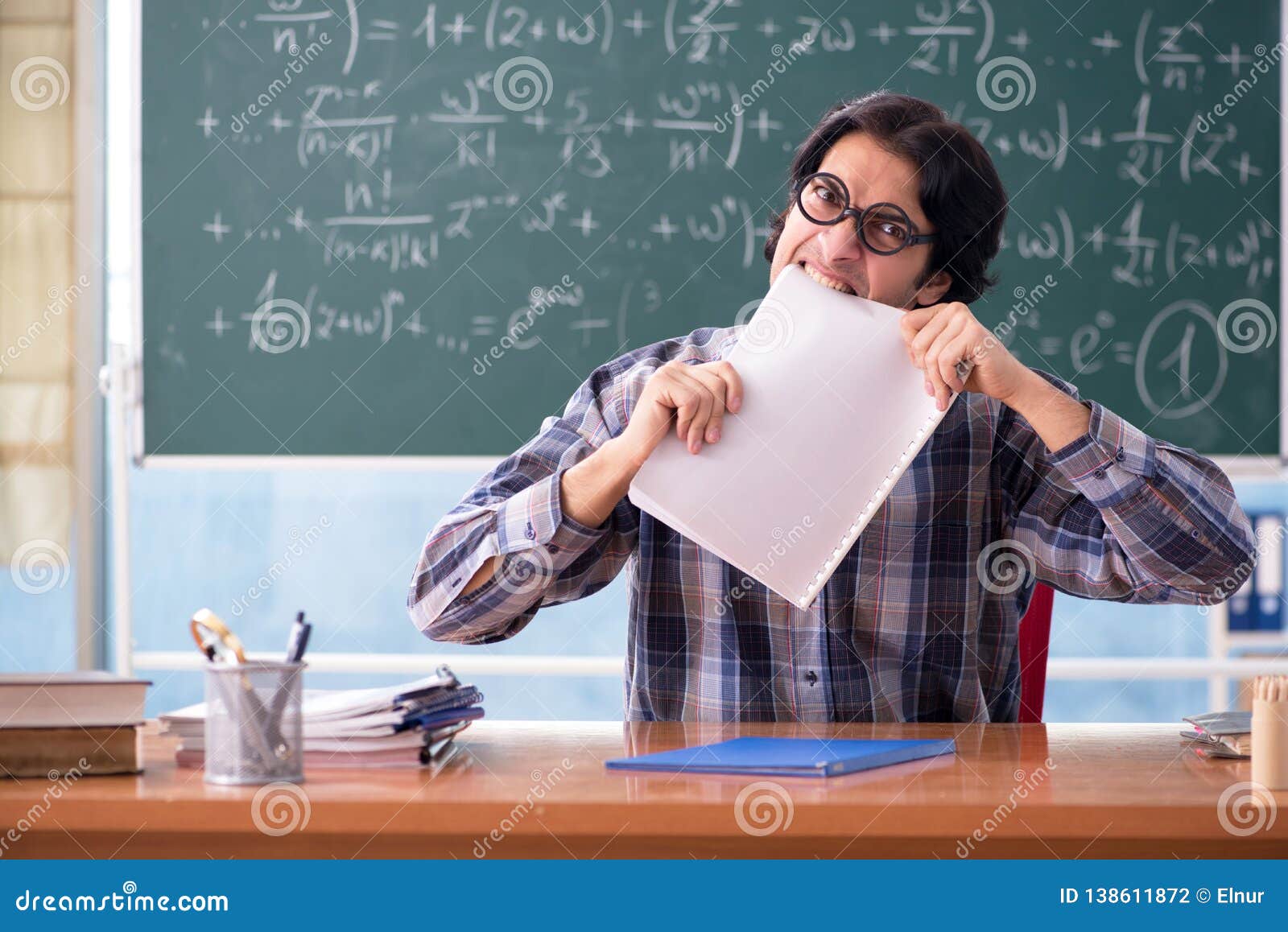 The Young Funny Math Teacher in Front of Chalkboard Stock Photo - Image ...