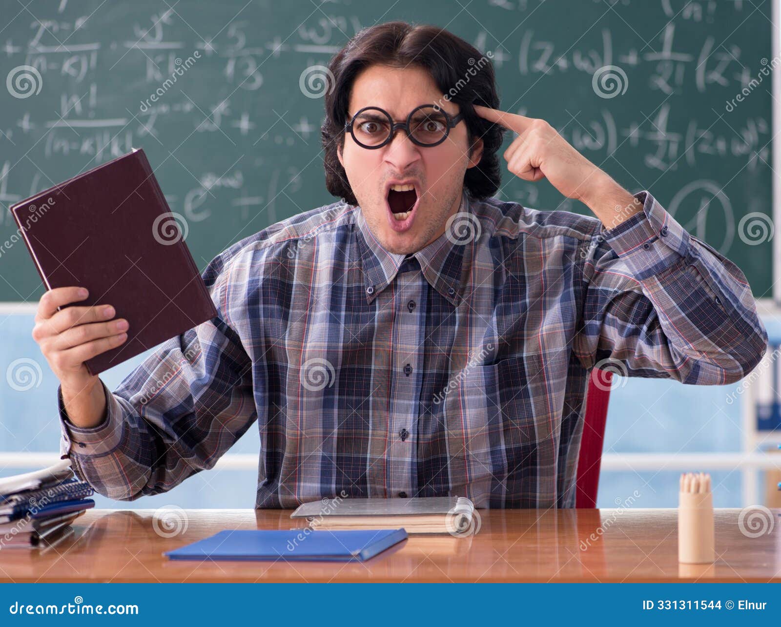 Young Funny Math Teacher in Front of Chalkboard Stock Photo - Image of ...