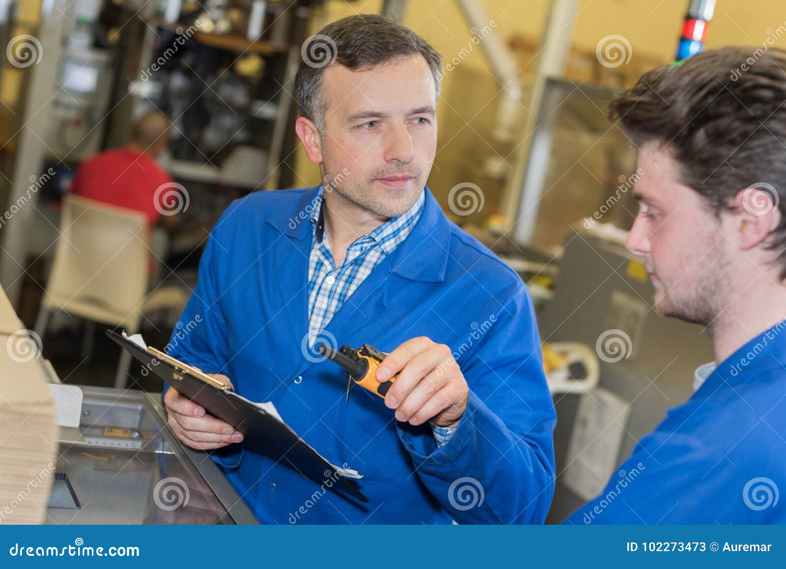 Young Future Engineer Being Supervised by Teacher Stock Image - Image ...