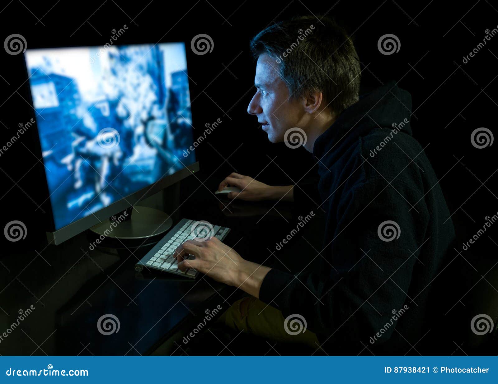 Young gamer in the dark stock image. Image of back, geek - 87938421