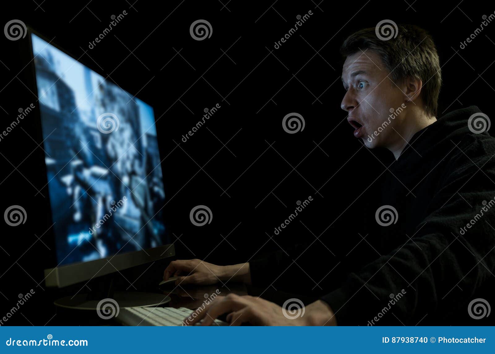 Young gamer in the dark stock photo. Image of dark, computer - 87938740