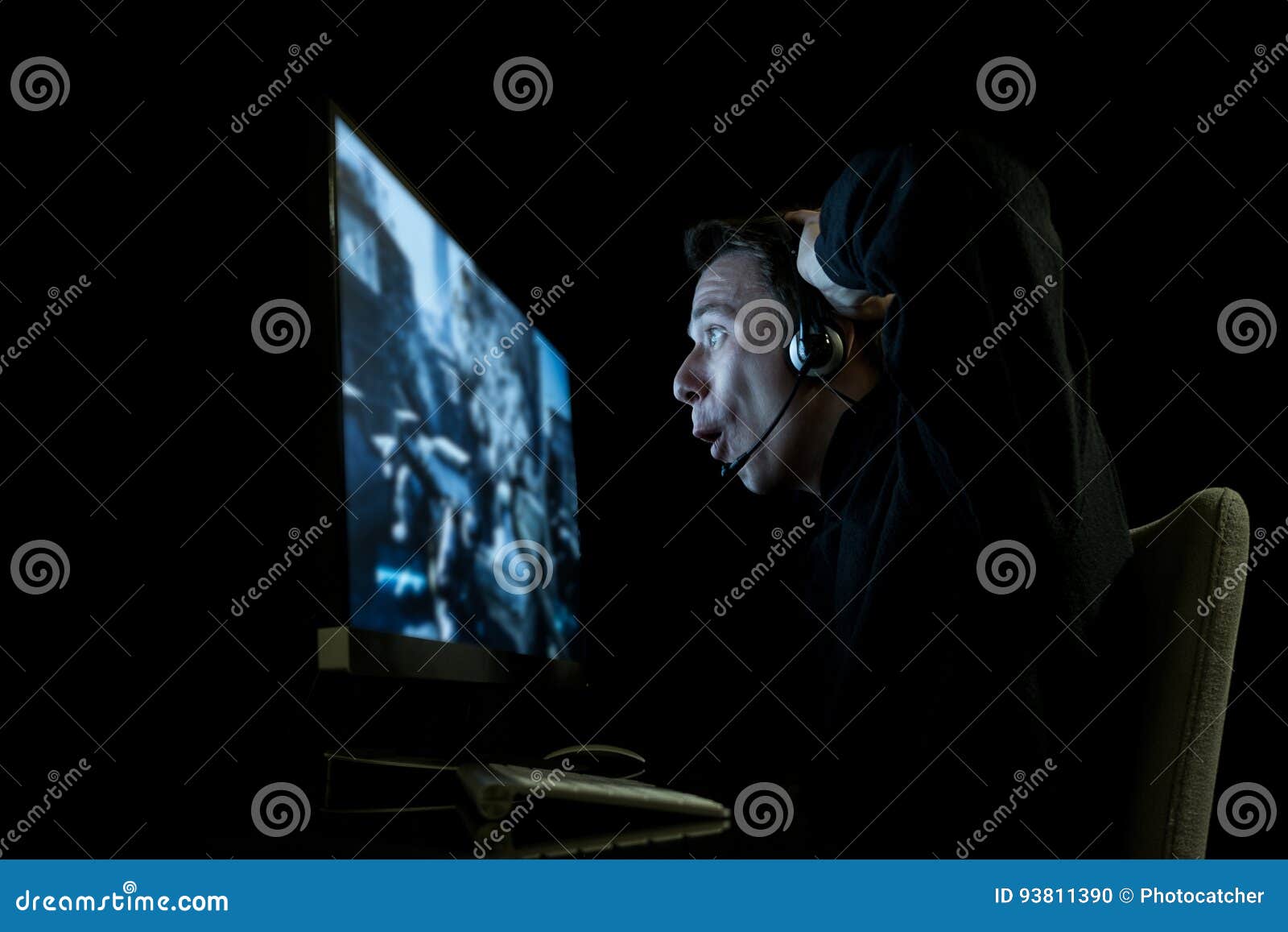 Young gamer in the dark stock photo. Image of emotion - 93811390