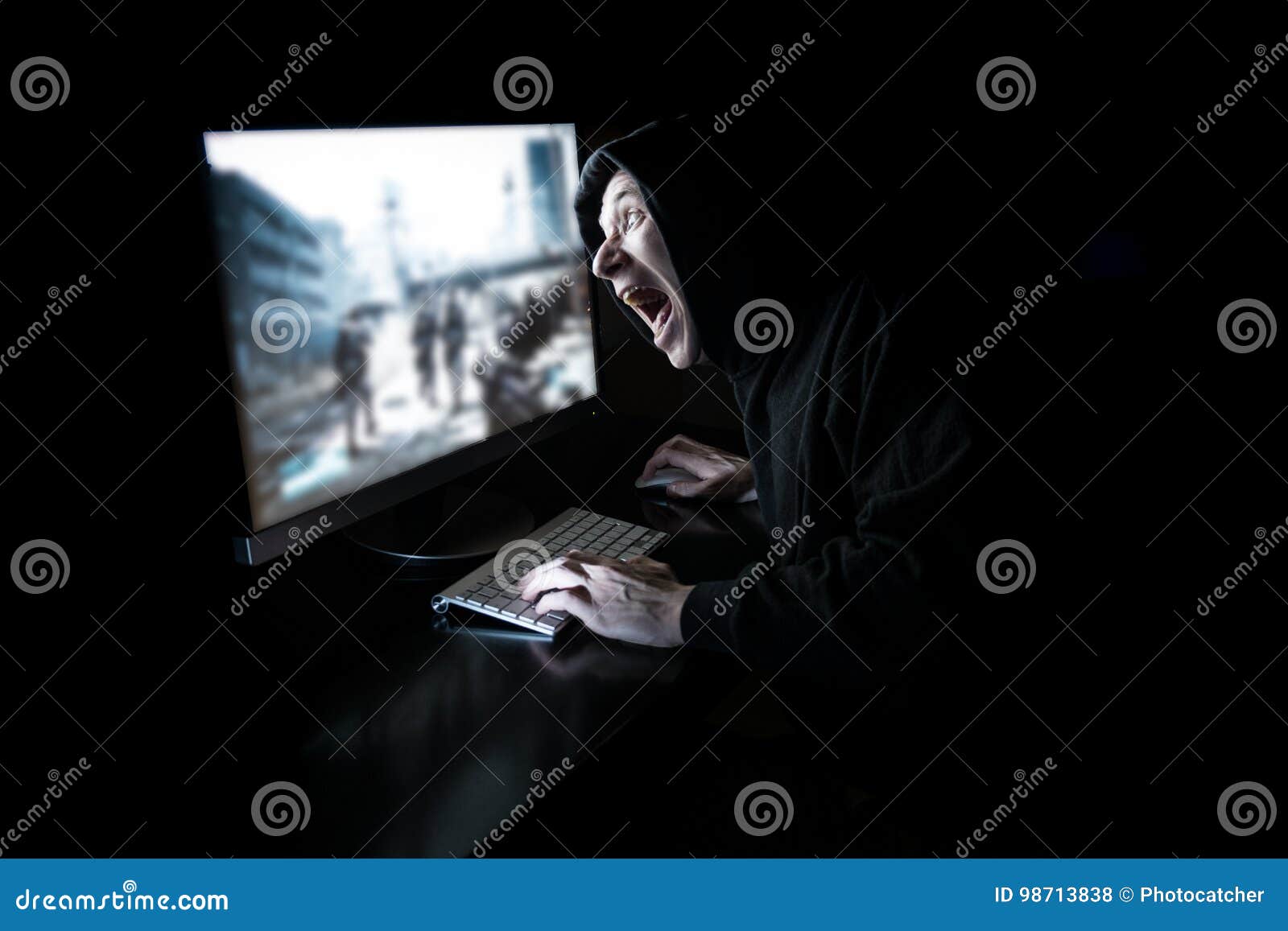Young gamer in the dark stock photo. Image of male, gable - 98713838