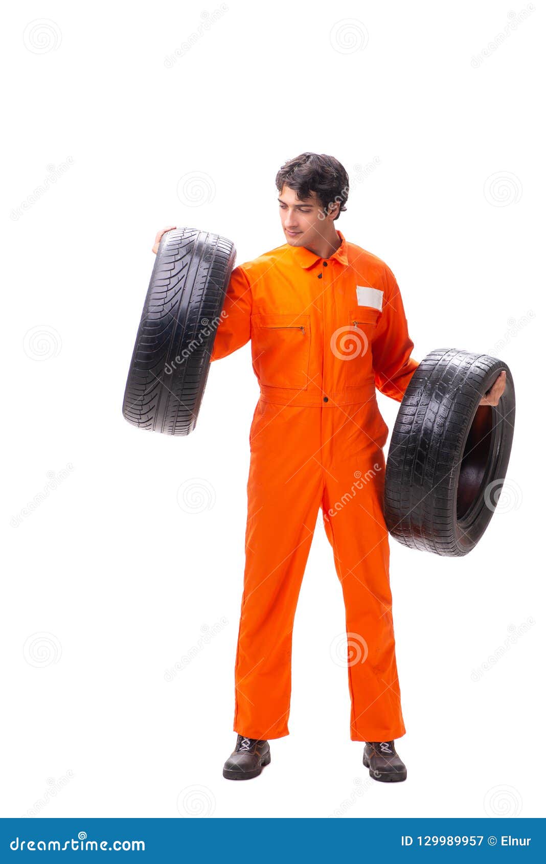 The Young Garage Worker with Tyre Isolated on White Stock Image - Image ...