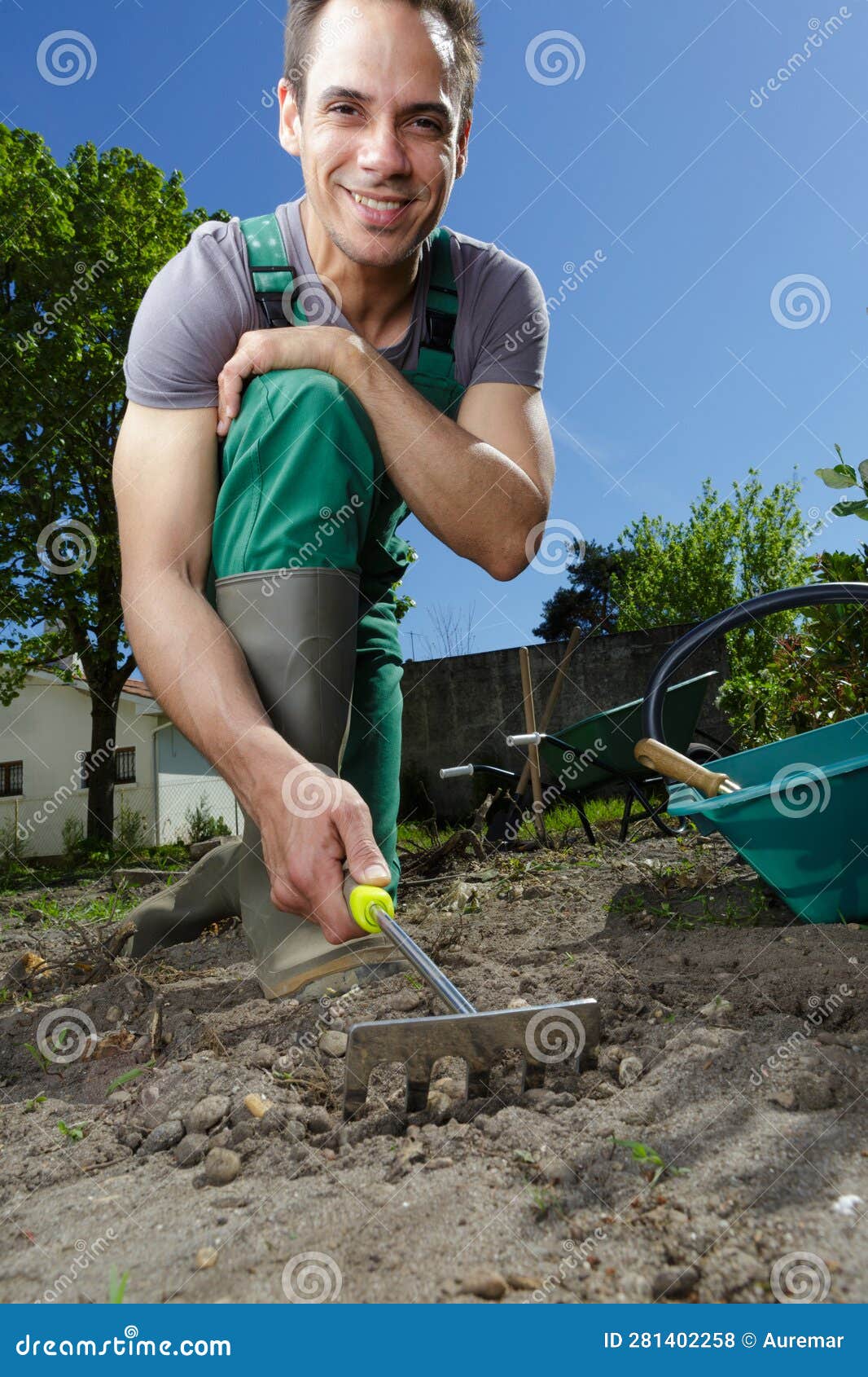 Young gardener using rake stock photo. Image of village - 281402258 Young gardener using rake stock photo. Image of village - 281402258