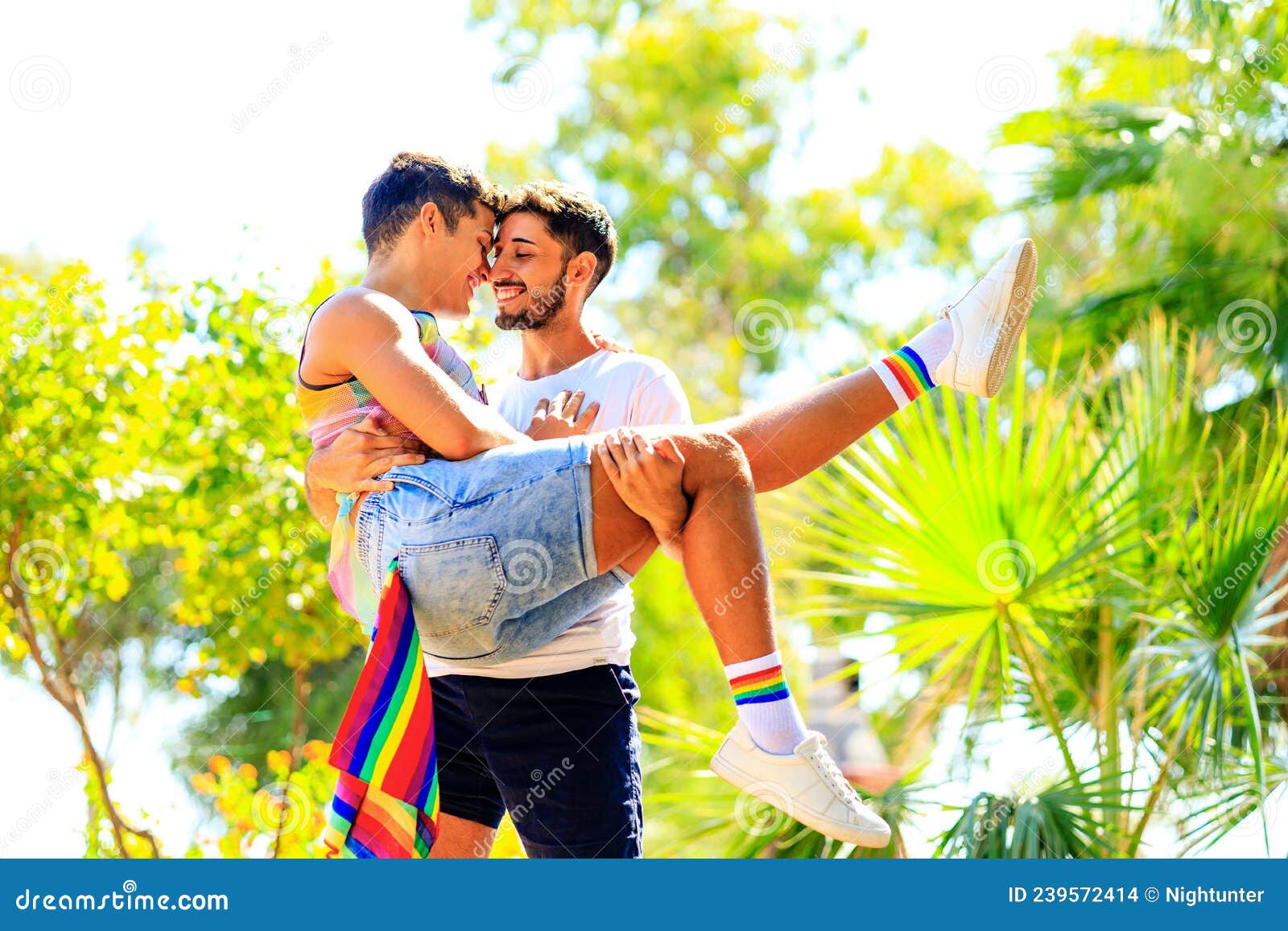 Young Gay Couple Embracing And Showing Their Love To Everyone Stock