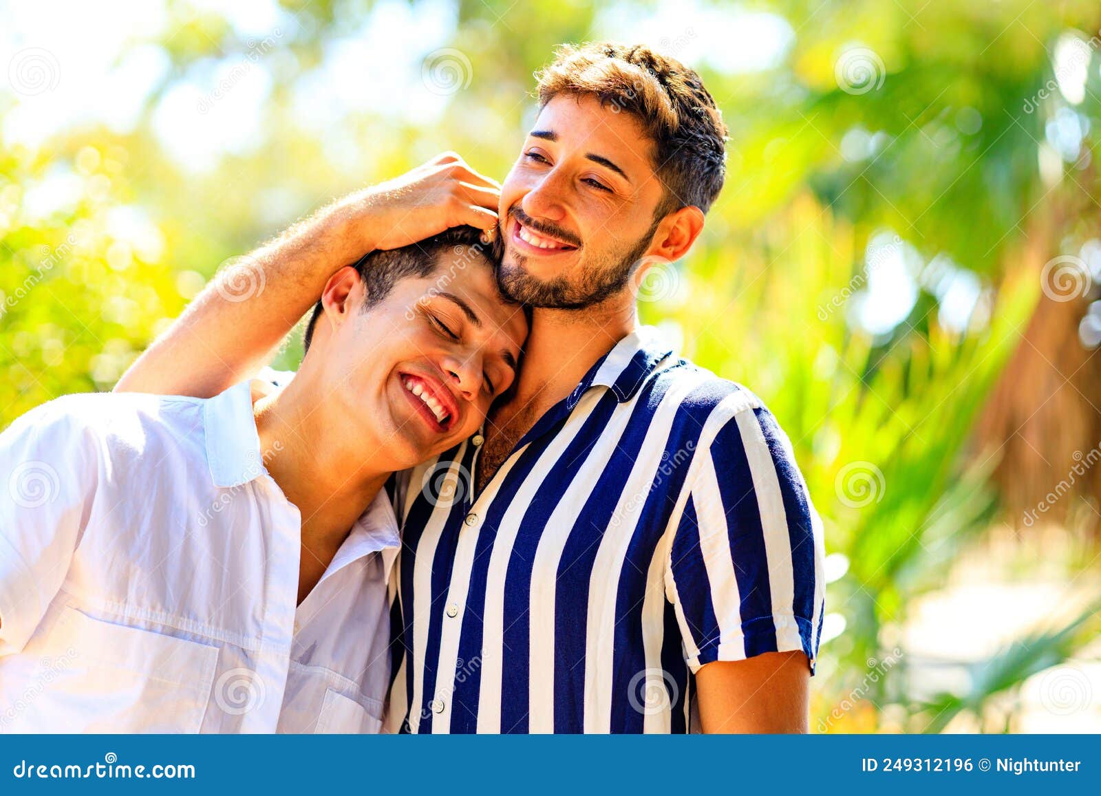 Young Gay Couple Embracing And Showing Their Love To Everyone Stock