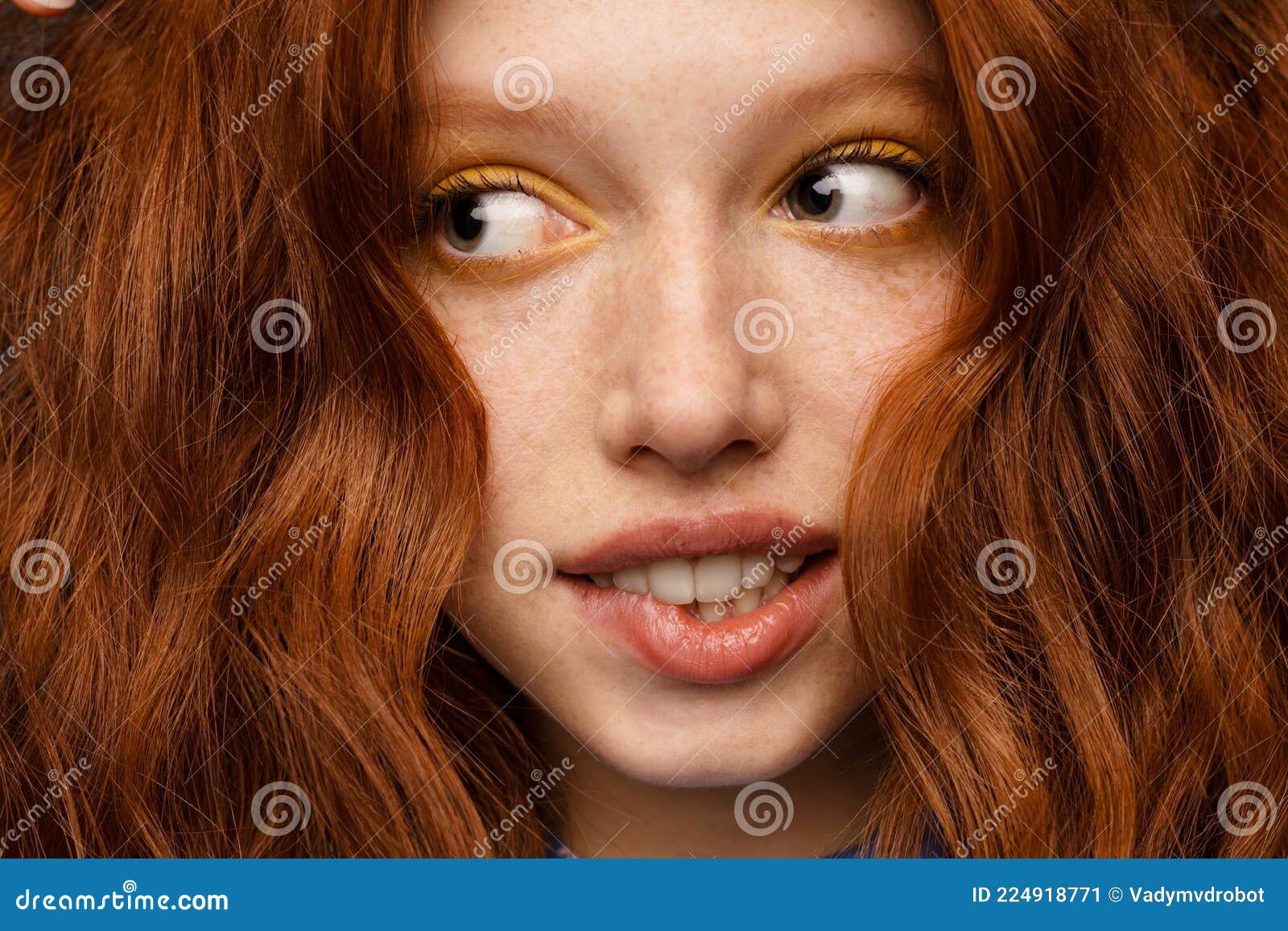 Young Ginger White Woman with Makeup Posing and Looking Aside Stock ...