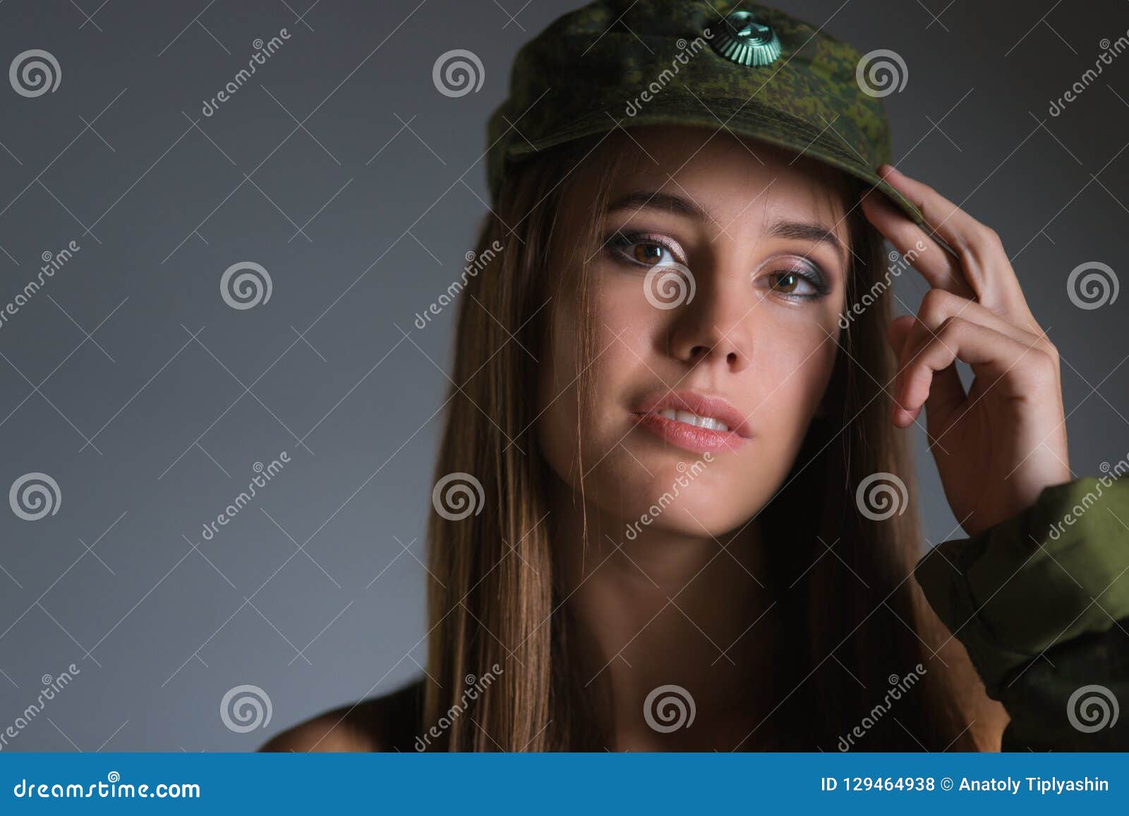 Young girl in army uniform stock photo. Image of fashion - 129464938