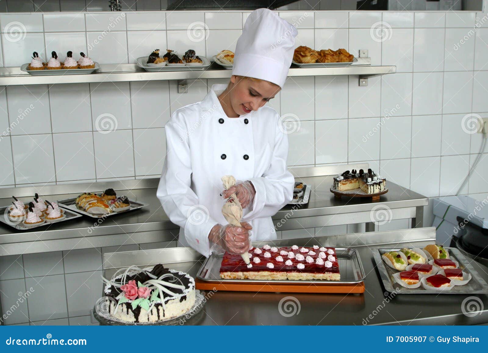 Young girl baking cakes stock image. Image of domestic - 7005907