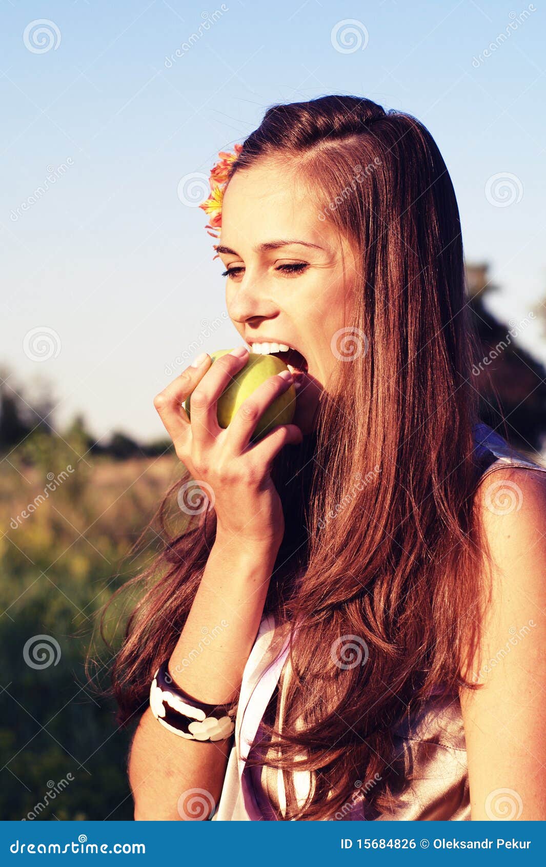 Young girl bite apple stock photo. Image of closed, processing - 15684826