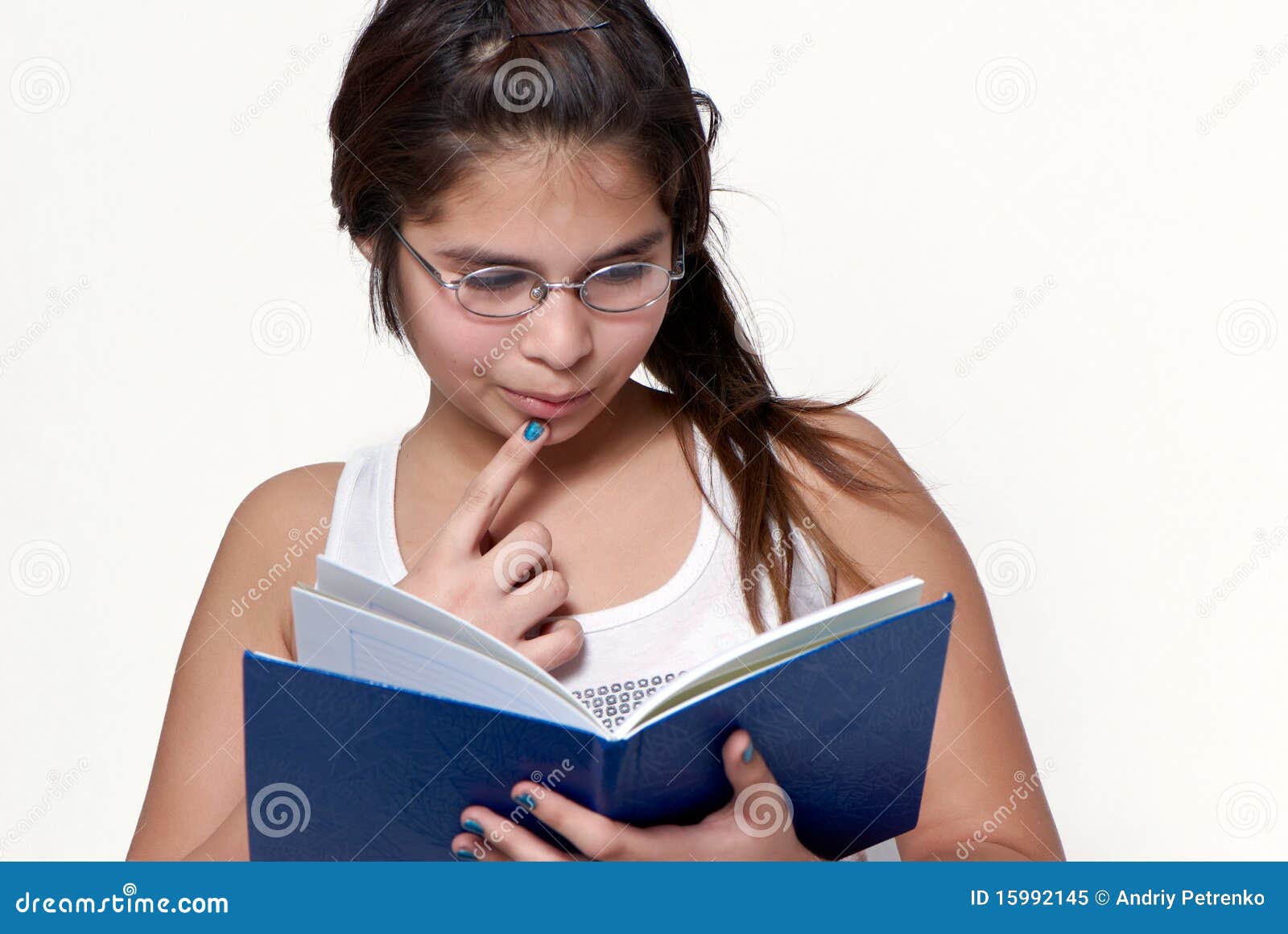 Young girl with a book stock image. Image of holding - 15992145