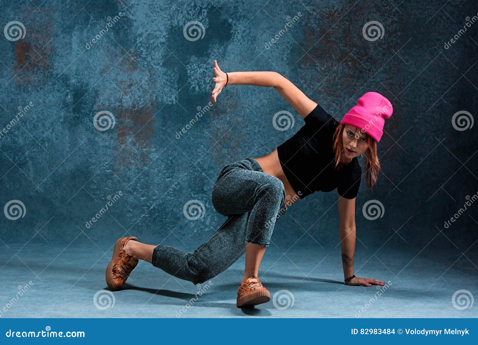 Young Girl Break Dancing on Wall Background. Stock Photo - Image of ...