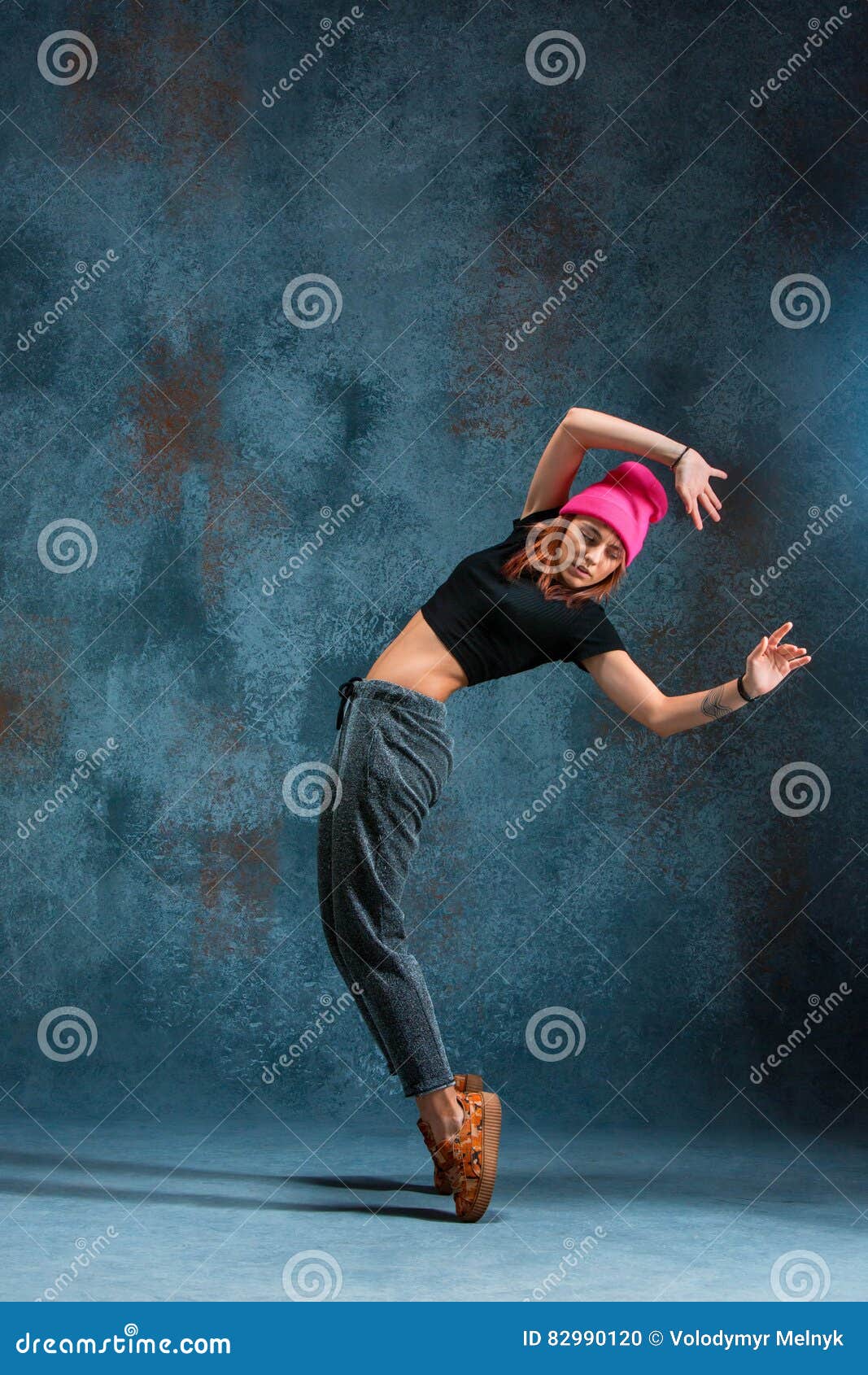 Young Girl Break Dancing on Wall Background. Stock Photo - Image of ...
