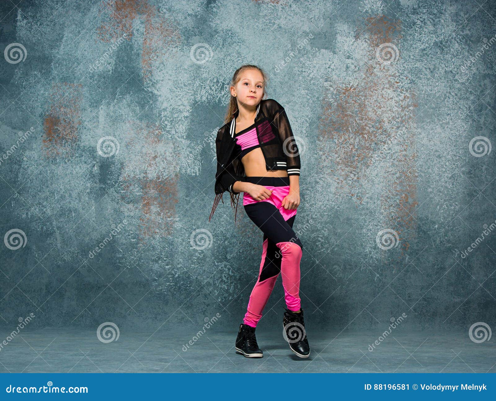 Young Girl Break Dancing on Wall Background. Stock Image - Image of ...