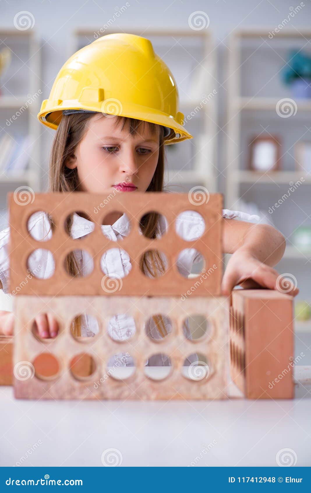 The Young Girl Building with Construction Bricks Stock Photo - Image of ...