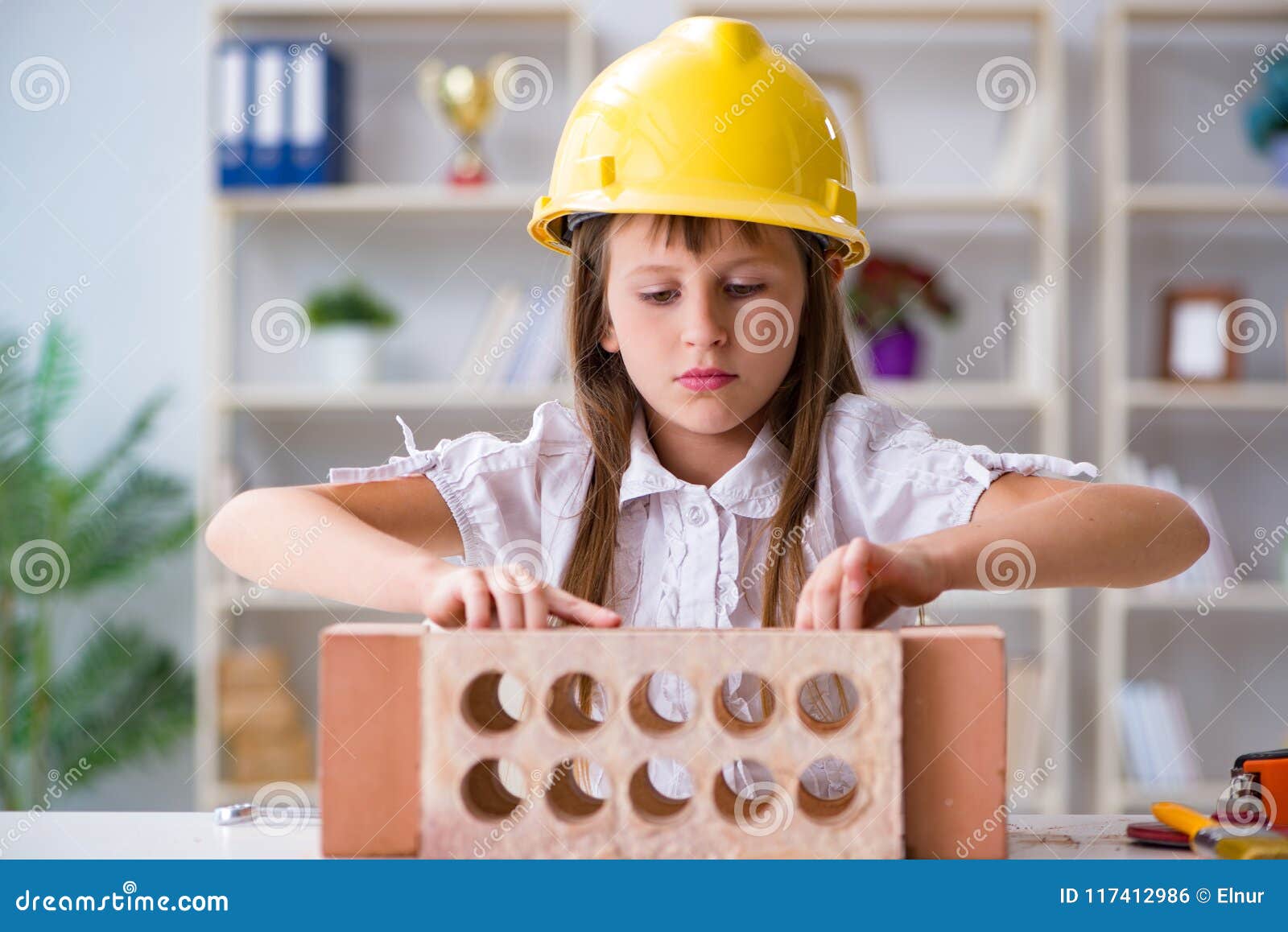 The Young Girl Building with Construction Bricks Stock Photo - Image of ...