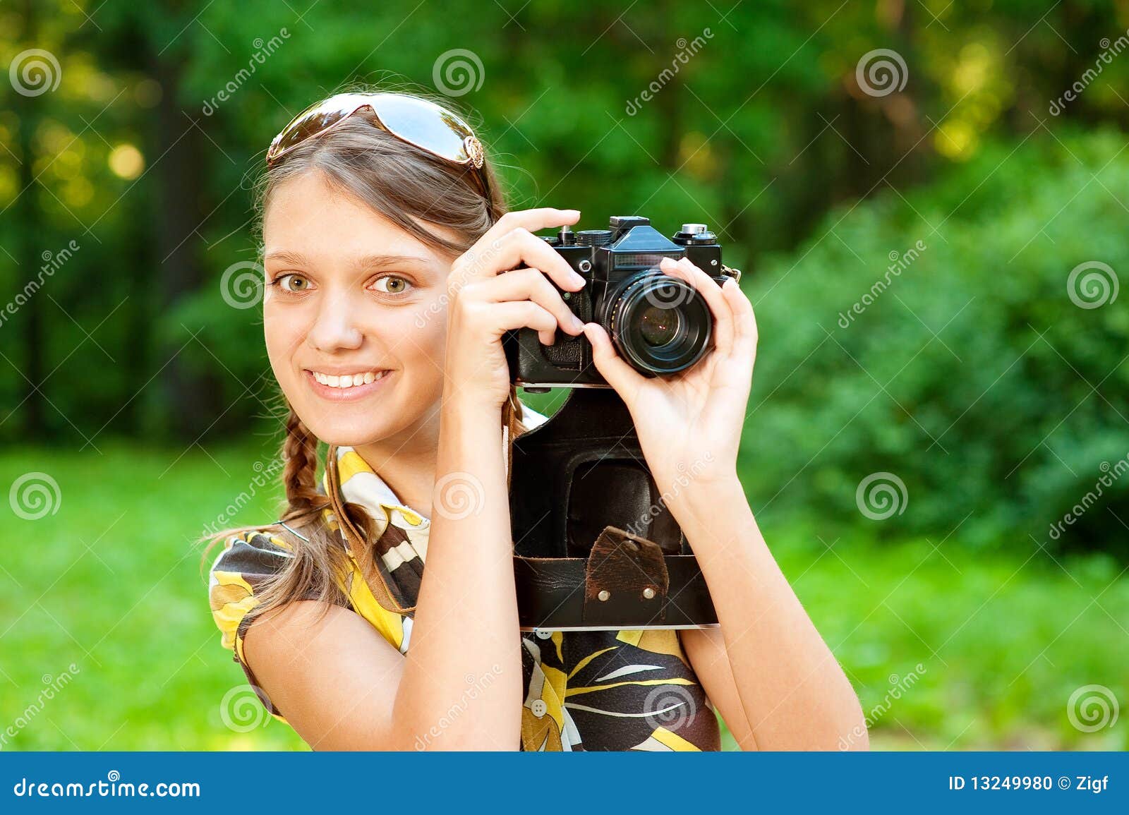 Young girl with camera stock photo. Image of gorgeous - 13249980