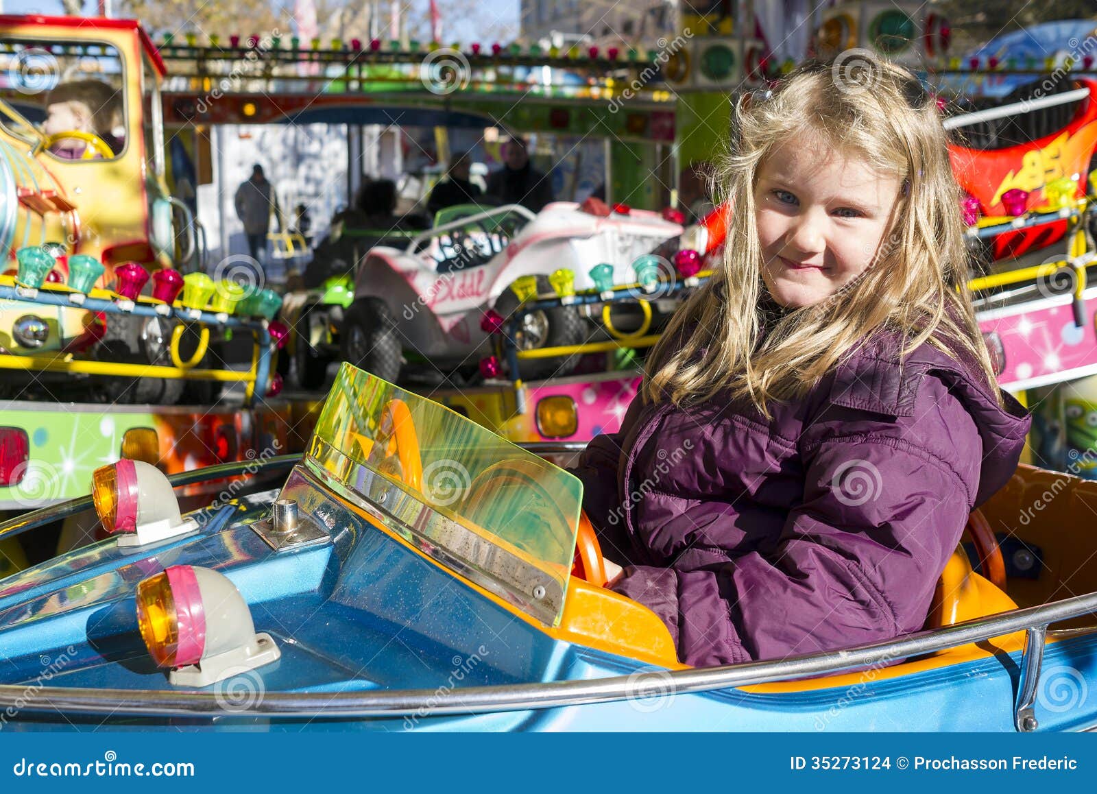 Young girl on carousel stock photo. Image of colorful - 35273124