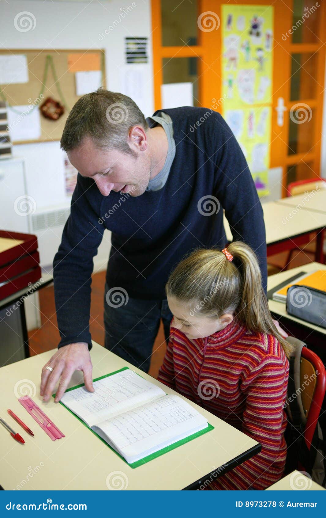 Young girl in classroom stock photo. Image of elementary - 8973278