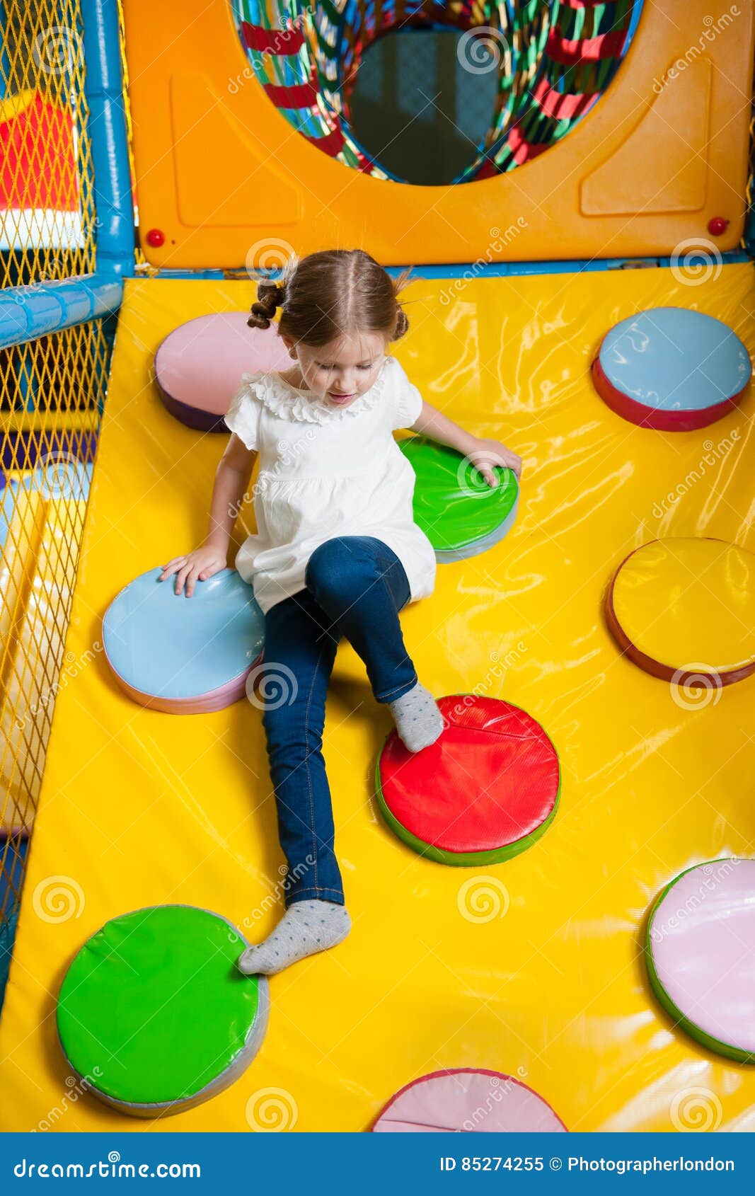Young Girl Climbing Down Ramp in Soft Play Centre Stock Image - Image ...