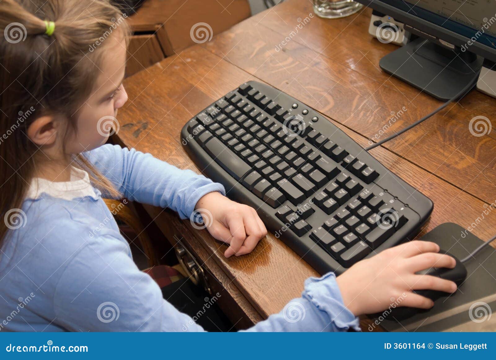 Young girl on computer stock photo. Image of education - 3601164