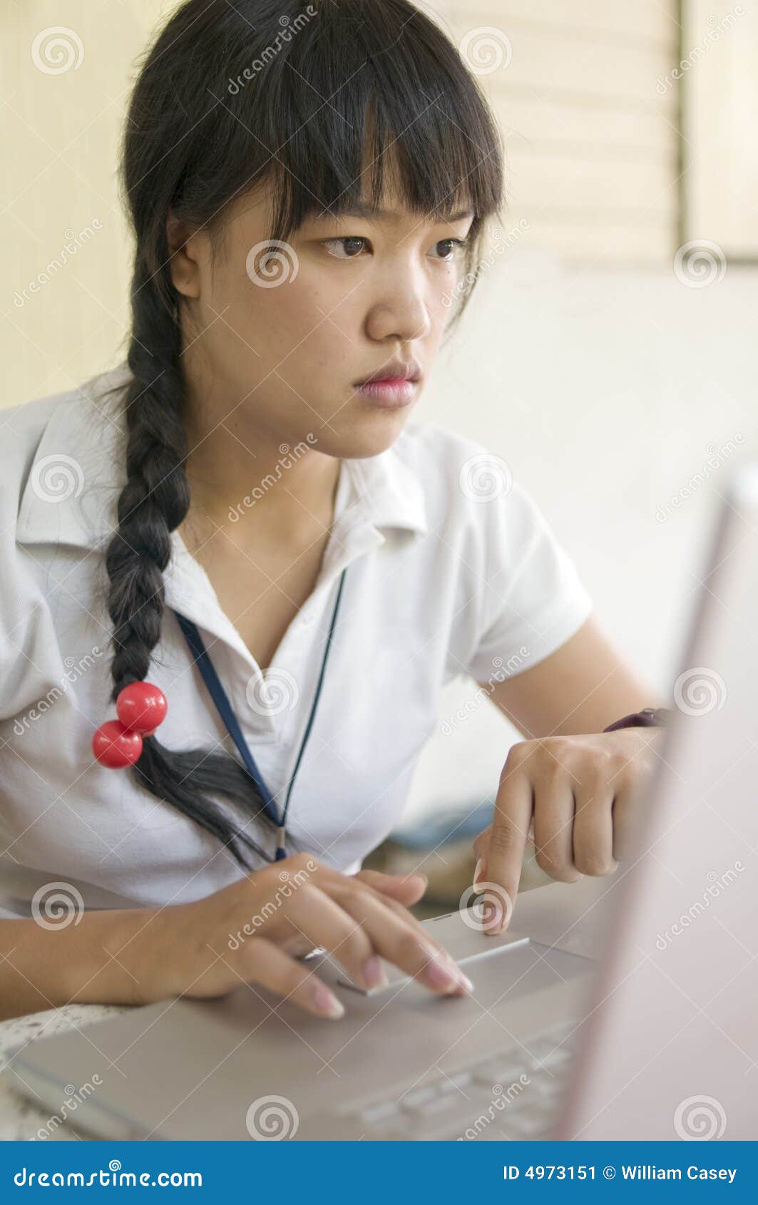 Young girl concentrating stock image. Image of ethnic - 4973151
