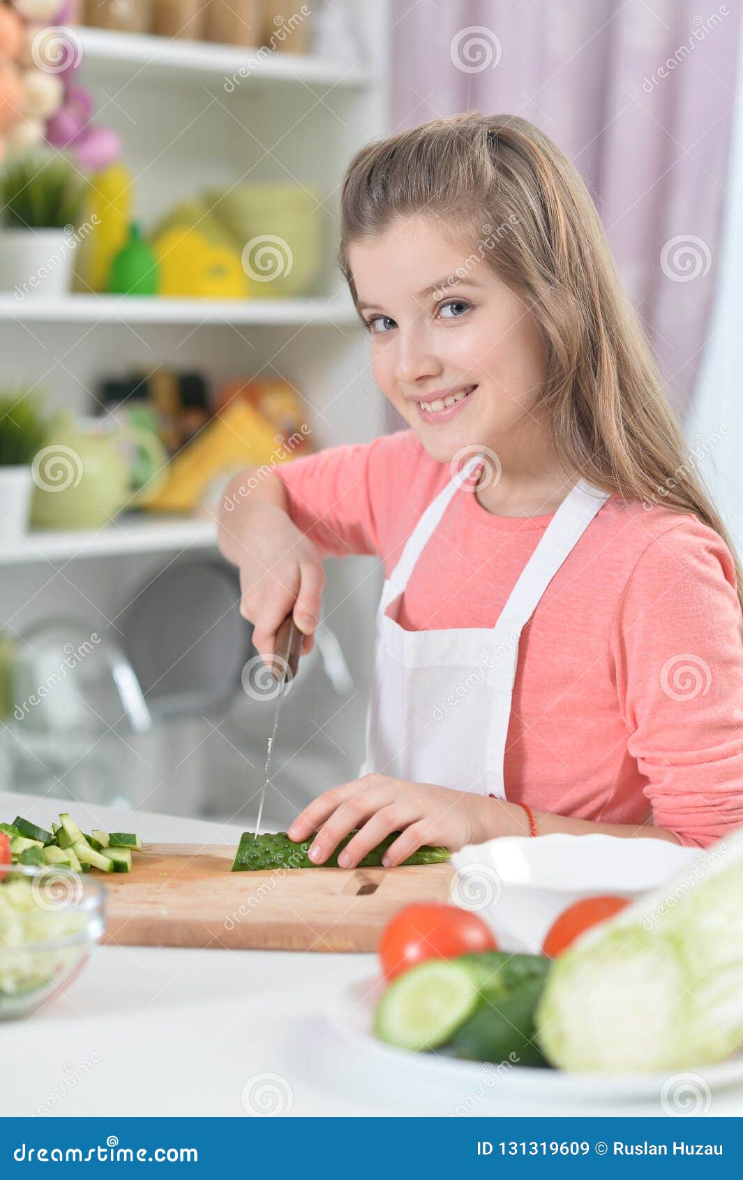 Young Girl Cooking in Kitchen at Home Stock Image - Image of computer ...
