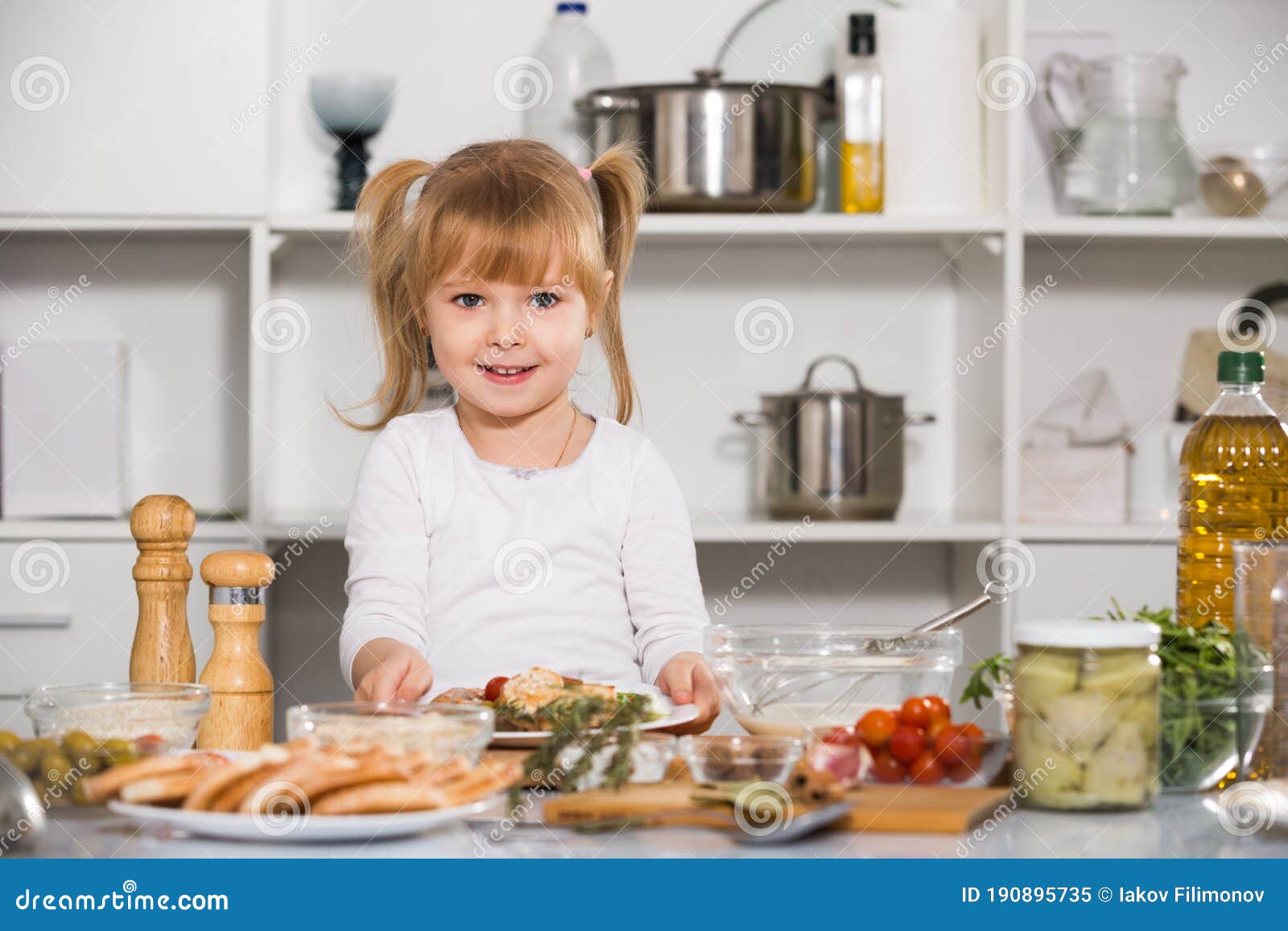 Young Girl is Cooking Vegetables Dish Alone in the Kitchen Stock Image ...