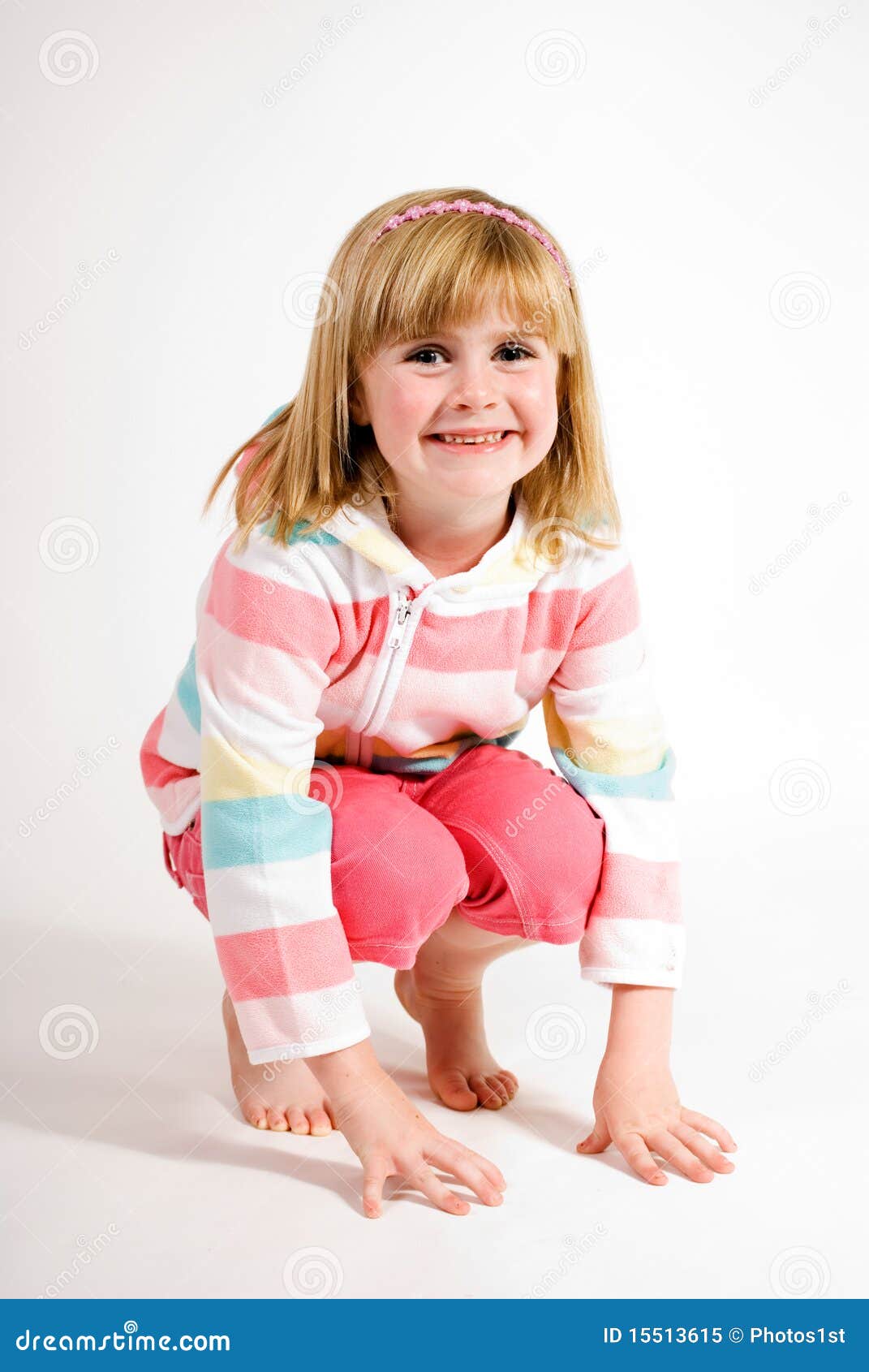 Young girl crouching stock image. Image of young, happy - 15513615