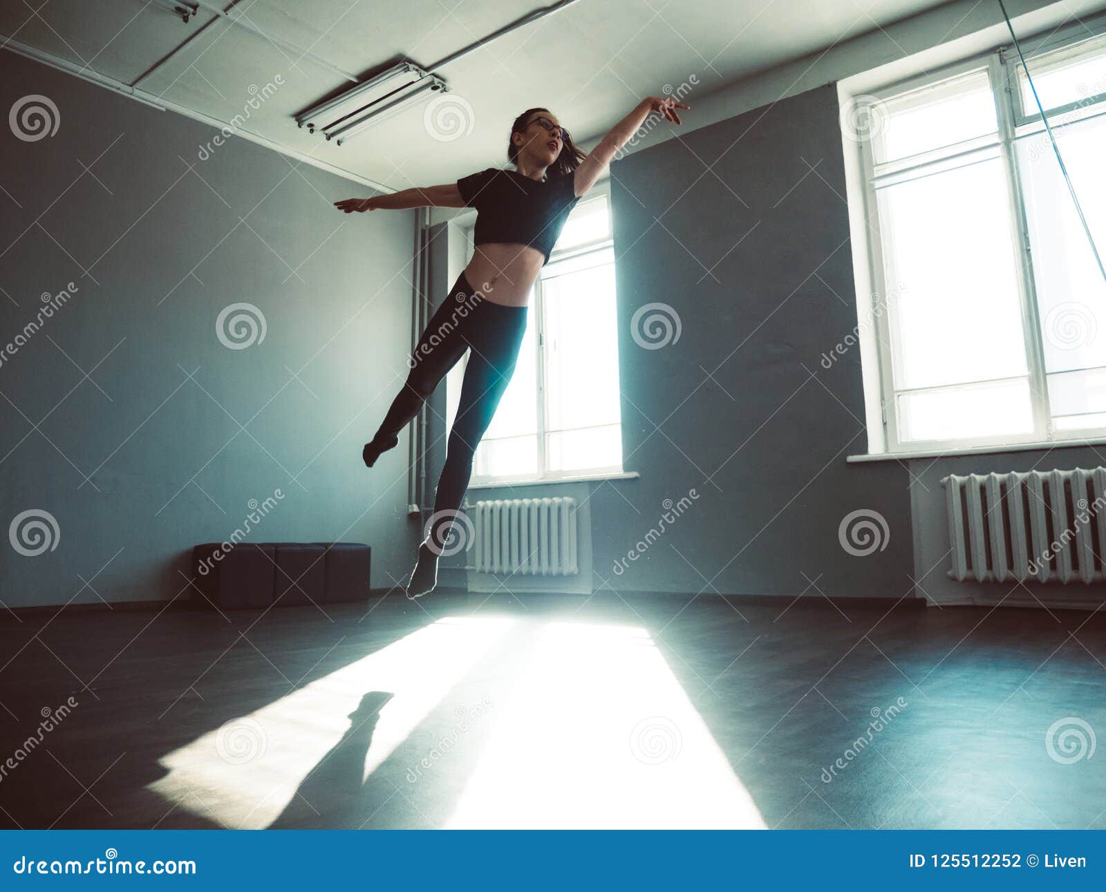 Young Girl Dancing Contemp. Dynamic Shot in the Jump. Stock Photo ...