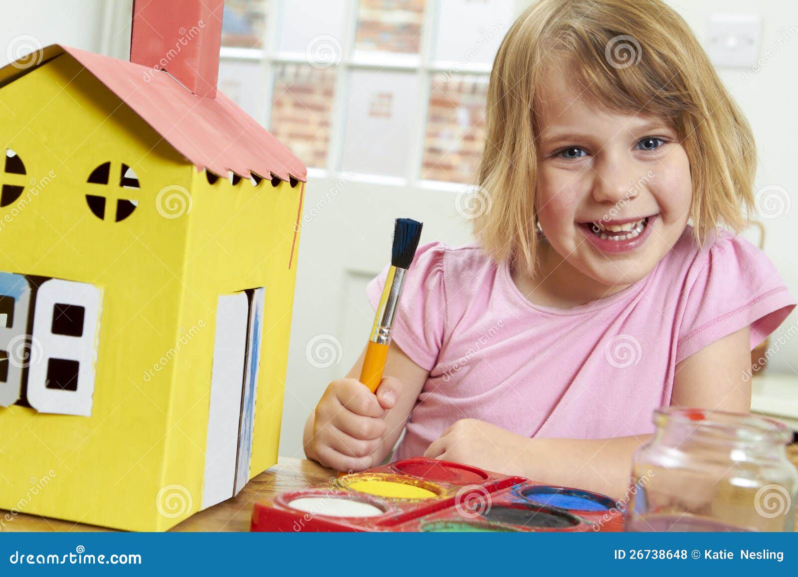 Young Girl Decorating Model House Indoors Stock Photo - Image of ...