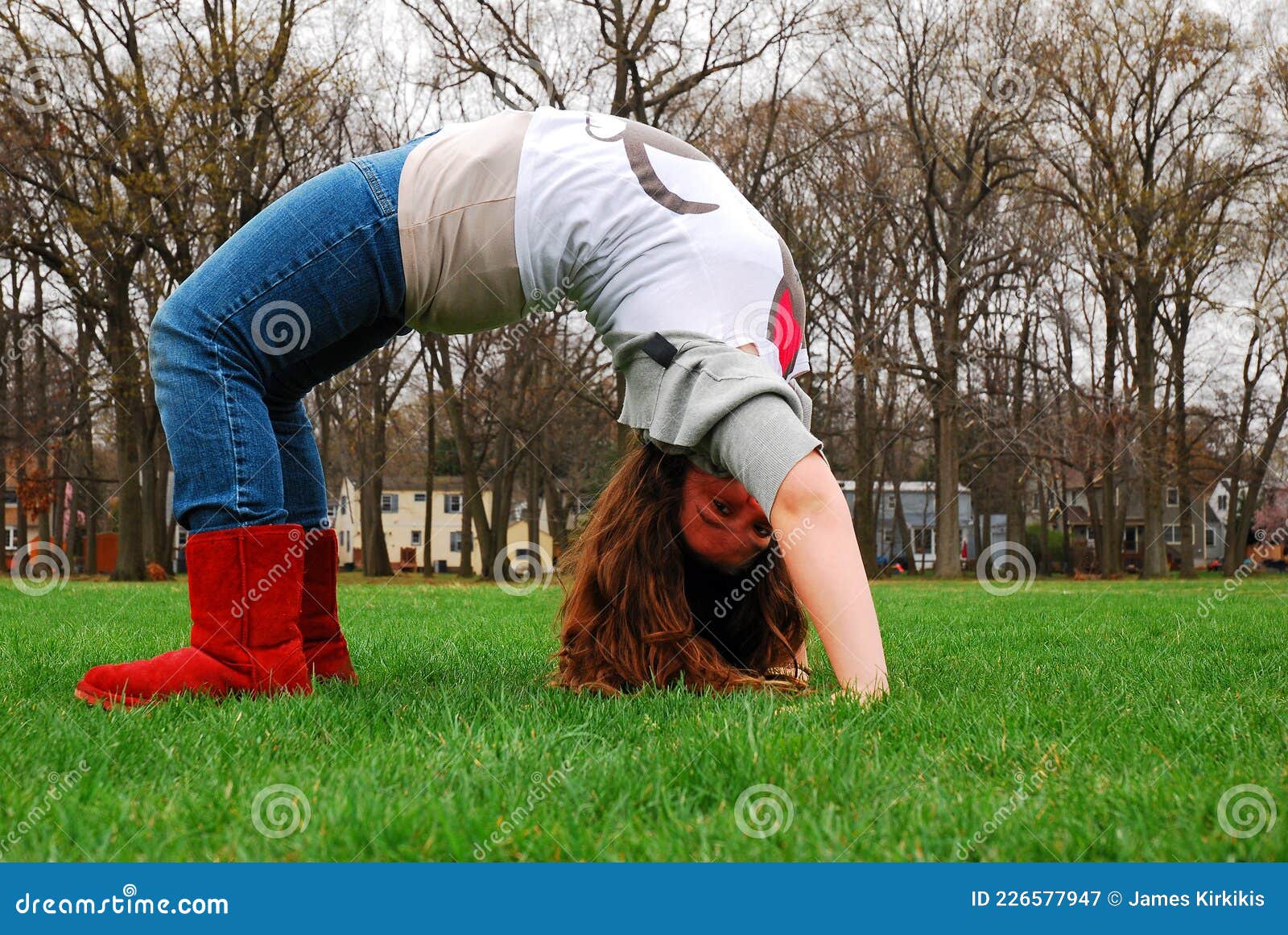 A Young Girl Demonstrates a Backbend Stock Image - Image of gymnastics ...