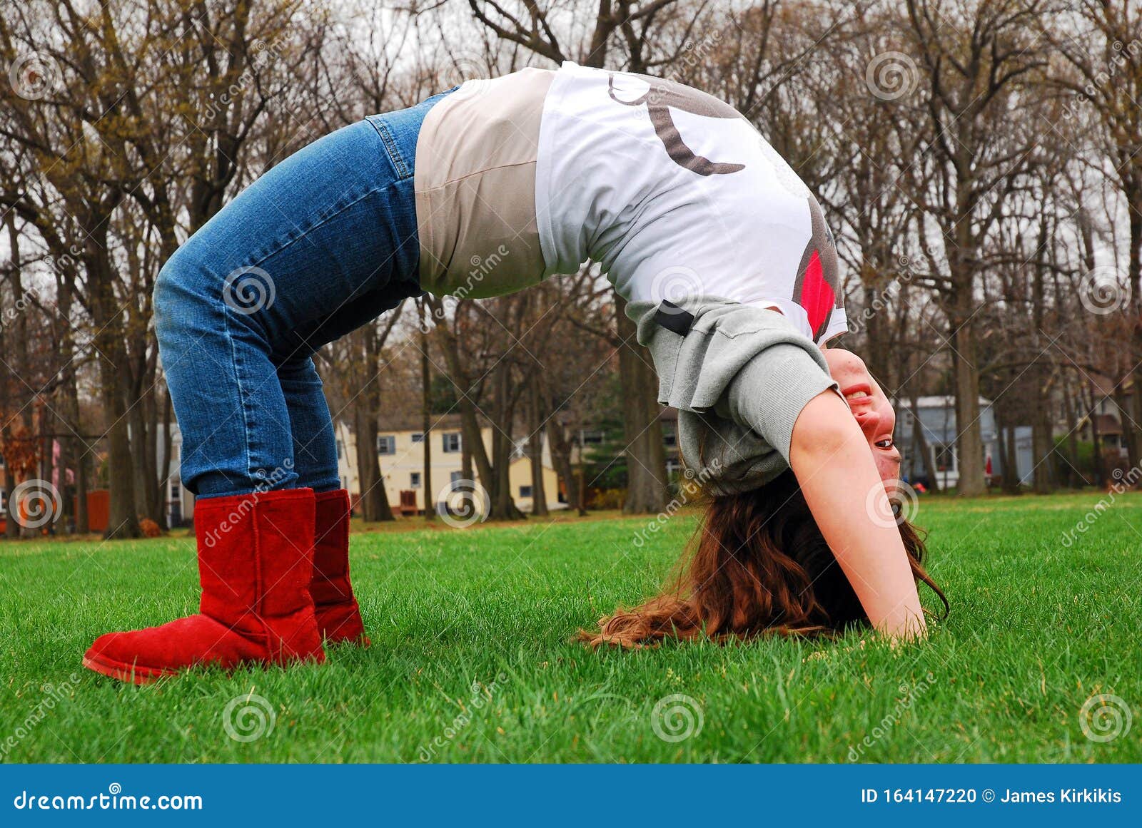 A Young Girl Does a Back Bend Stock Photo - Image of outdoors ...