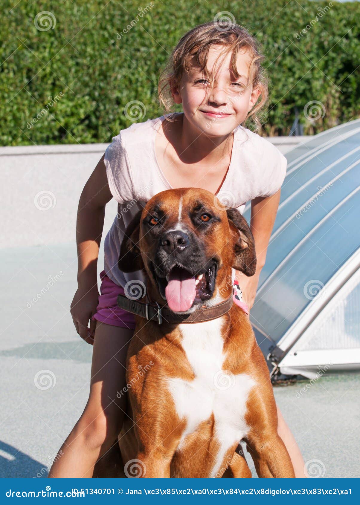 Young girl with dog stock image. Image of muzzle, play - 51340701