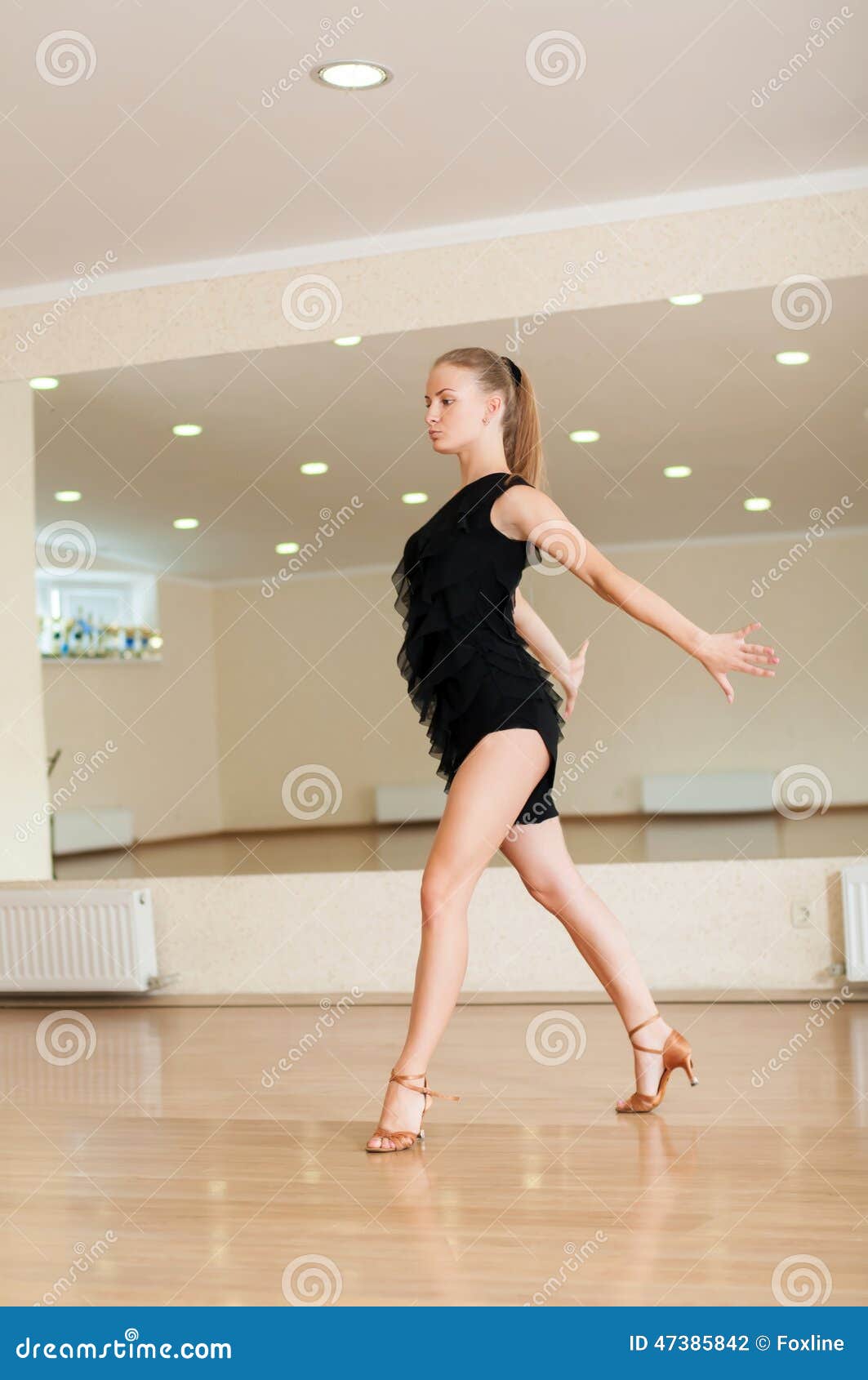 Young Girl Doing Exercises in a Dance Class Stock Photo - Image of ...