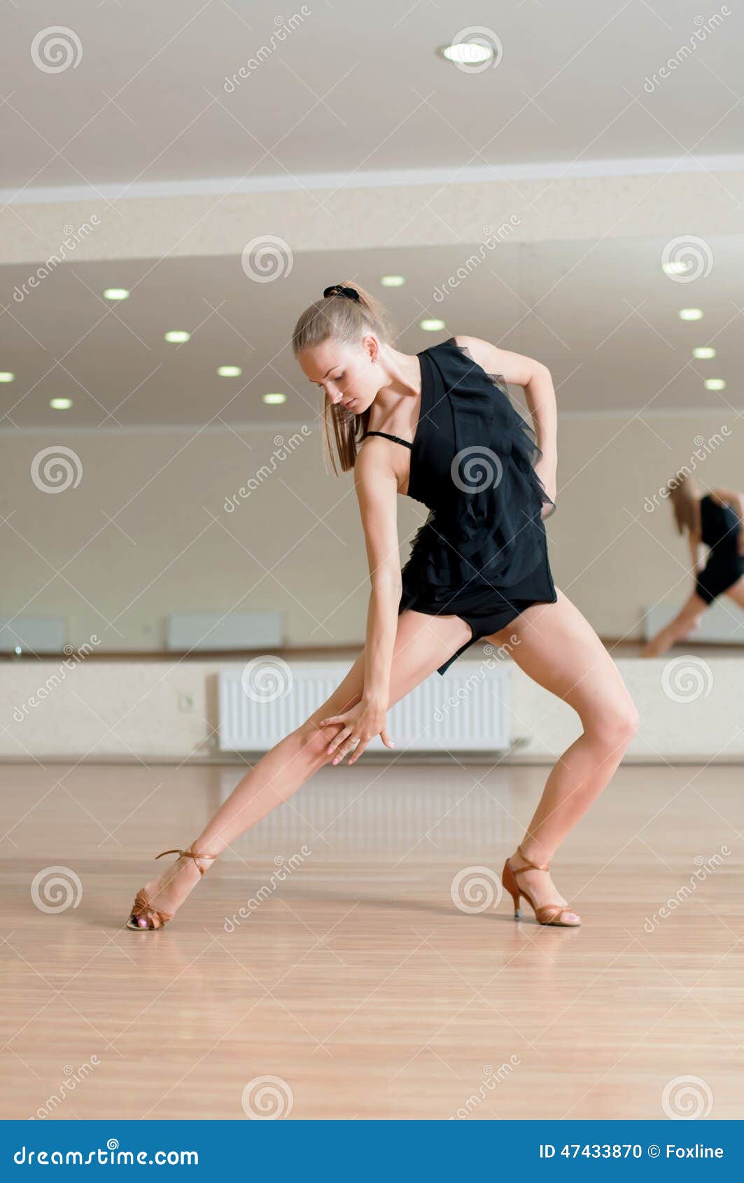 Young Girl Doing Exercises in a Dance Class Stock Photo - Image of ...