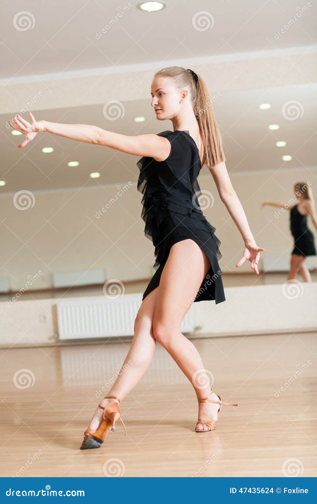 Young Girl Doing Exercises in a Dance Class Stock Photo - Image of ...