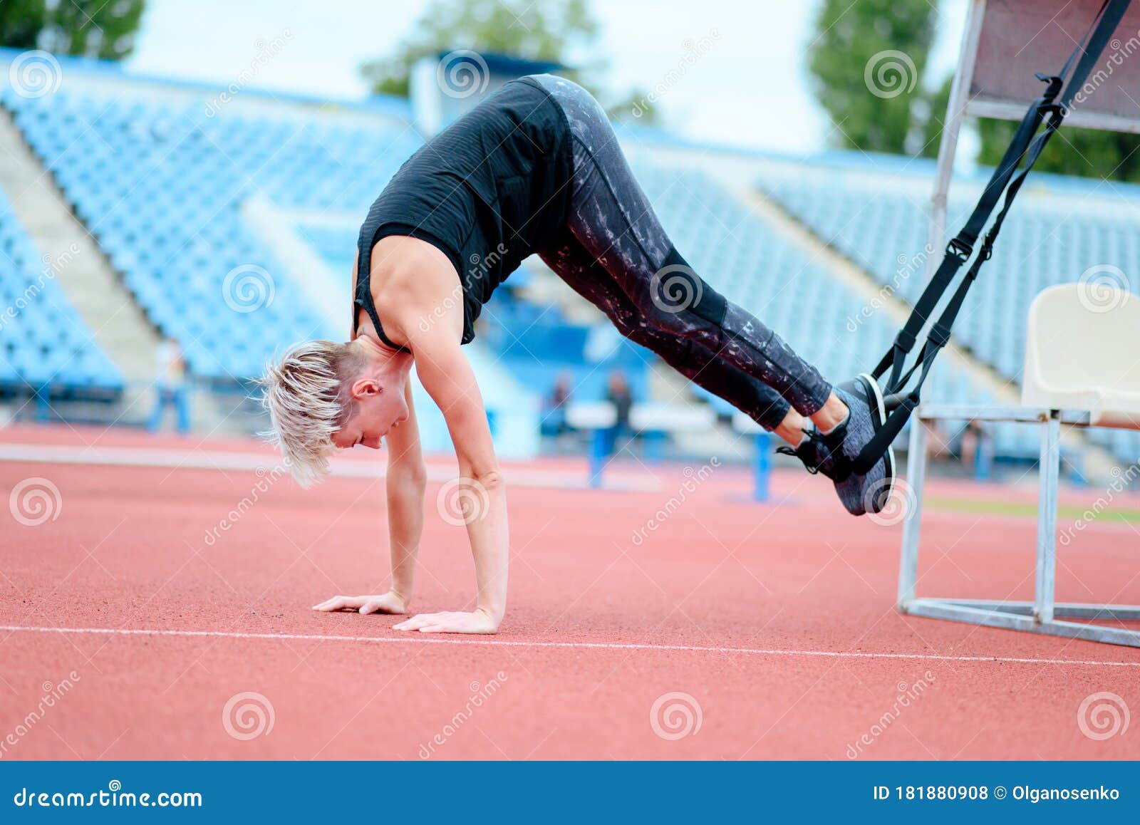 Young Girl Doing Exercises Outdoors Using Slings, TRX Loop Stock Photo ...