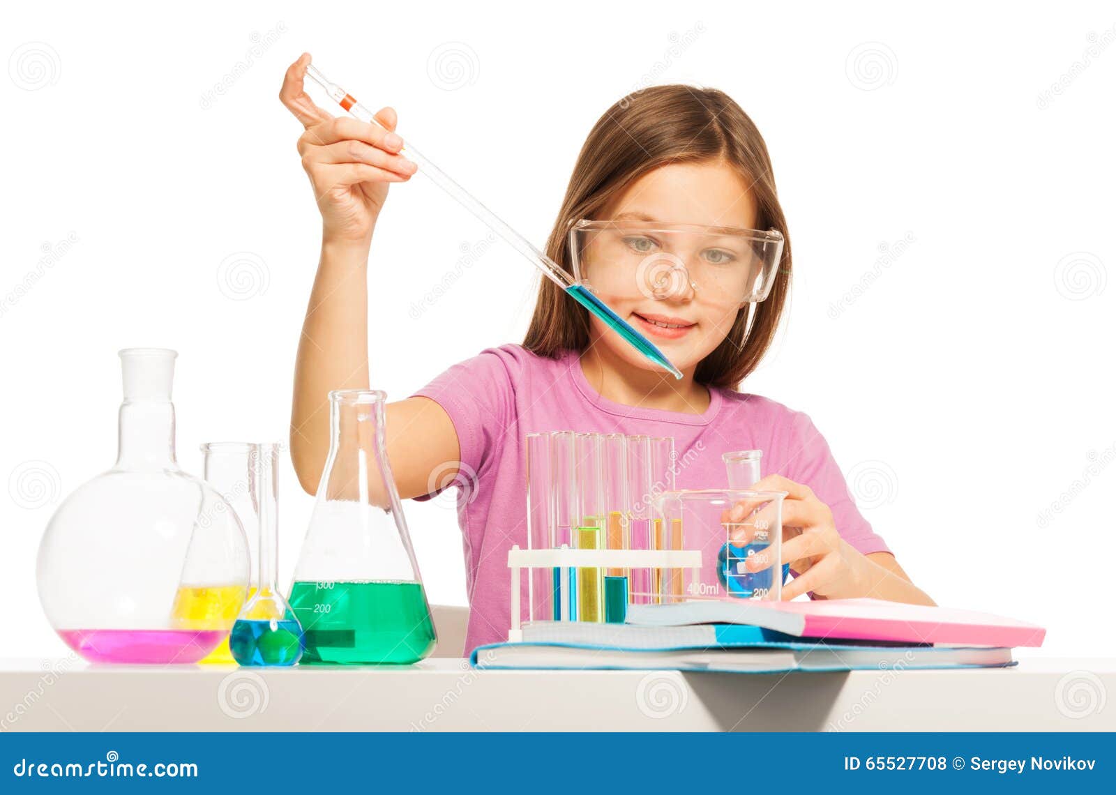 Young Girl Doing Her Chemical Test in Laboratory Stock Photo - Image of ...