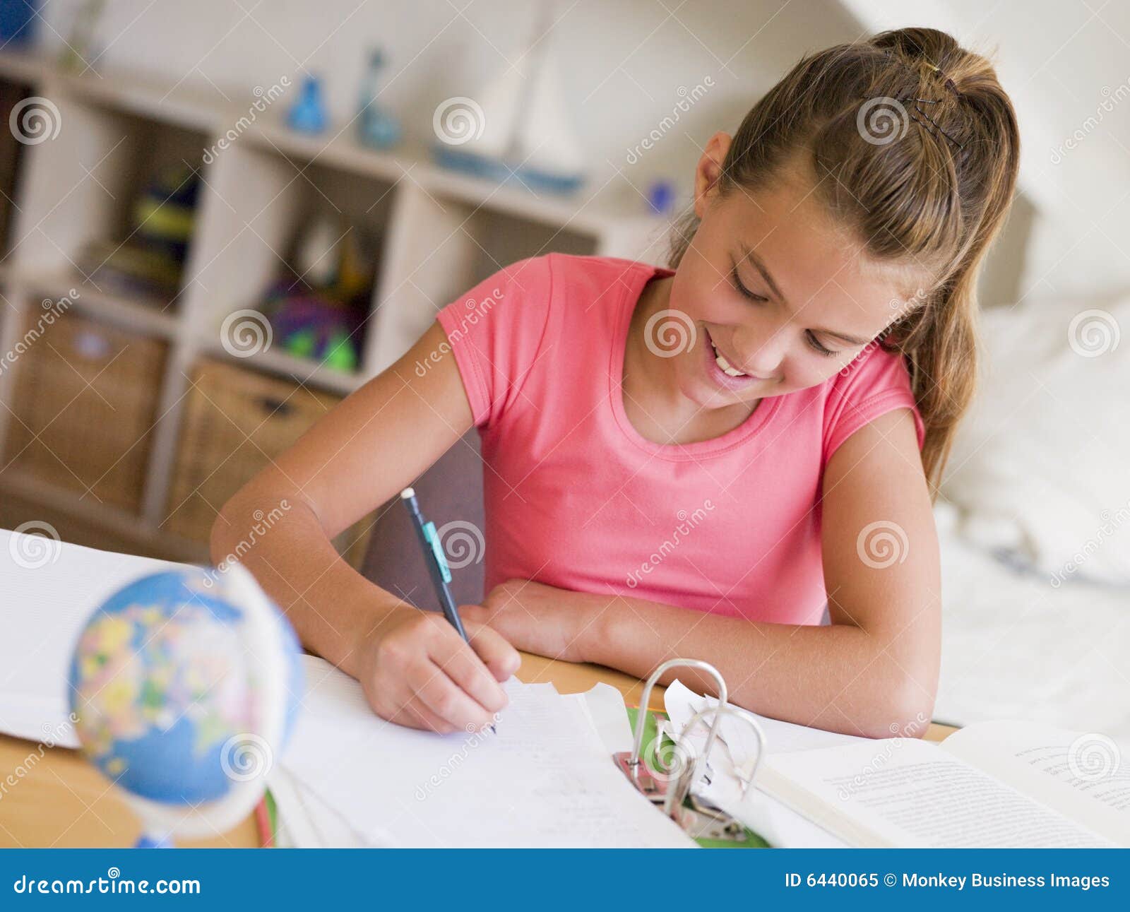 Young Girl Doing Her Homework Stock Image - Image of caucasian, holding ...