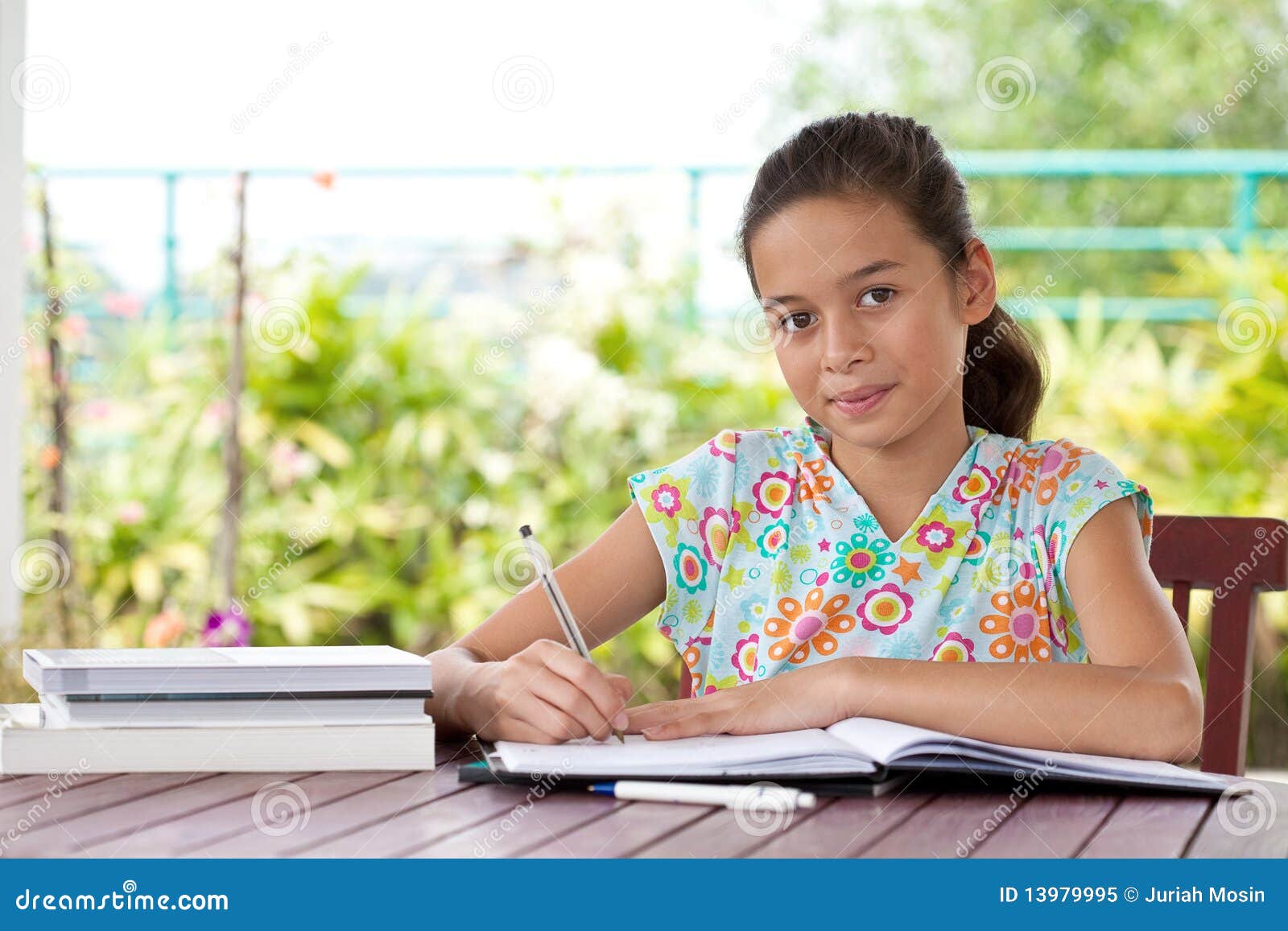 Young Girl Doing Her Homework in a Home Environmen Stock Image - Image ...