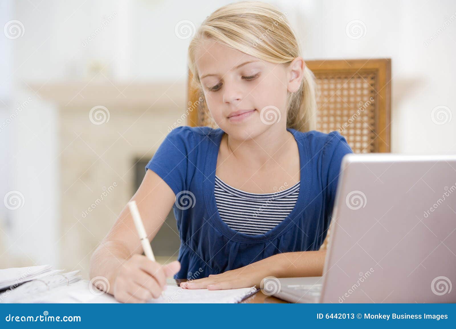 Young Girl Doing Homework and Using Laptop Stock Image - Image of child ...