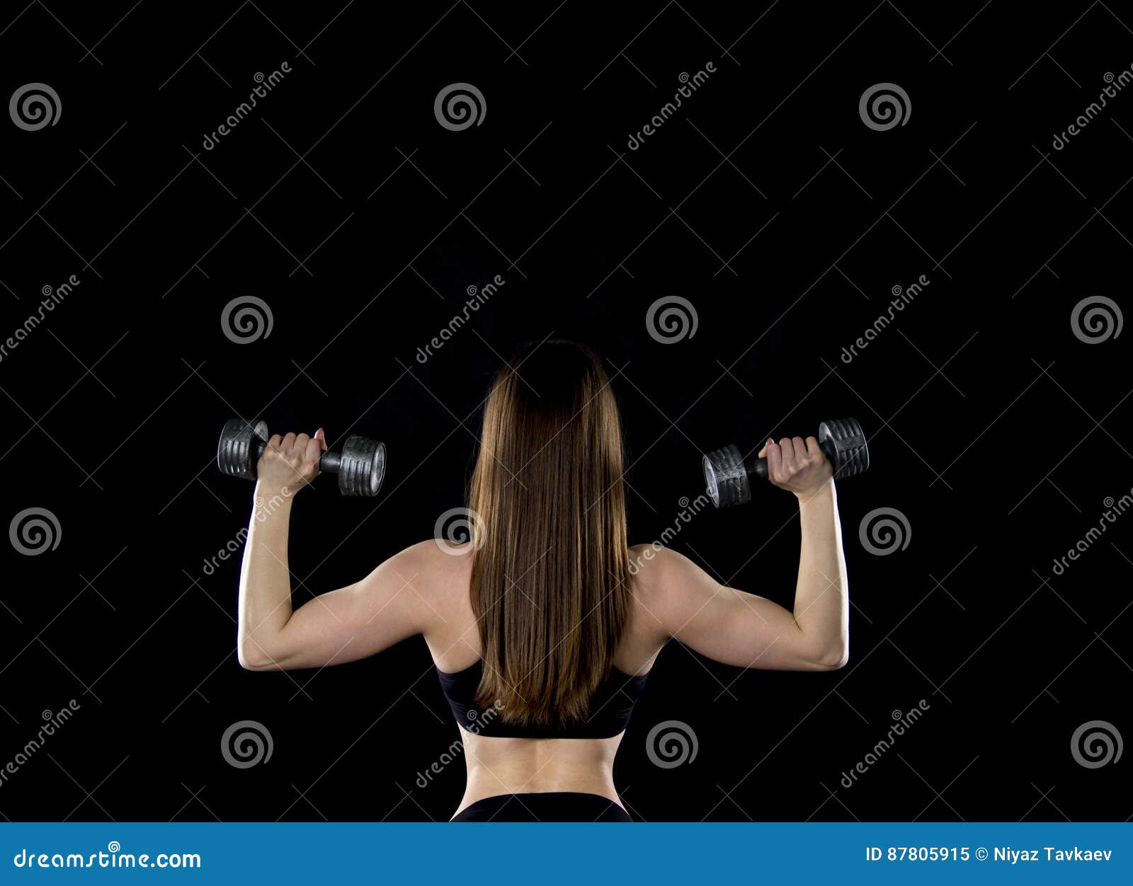 Young Girl Doing Shoulder Press Exercise in the Gym. Stock Image ...