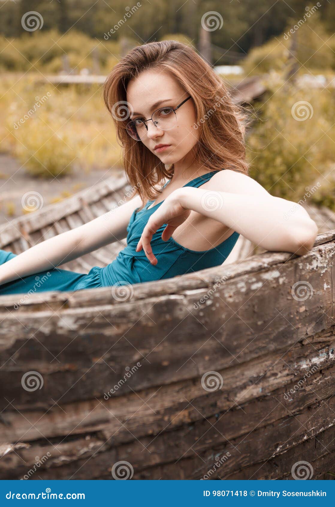 Girl On Shipwrecked Boat Stock Photography | CartoonDealer.com #24616562